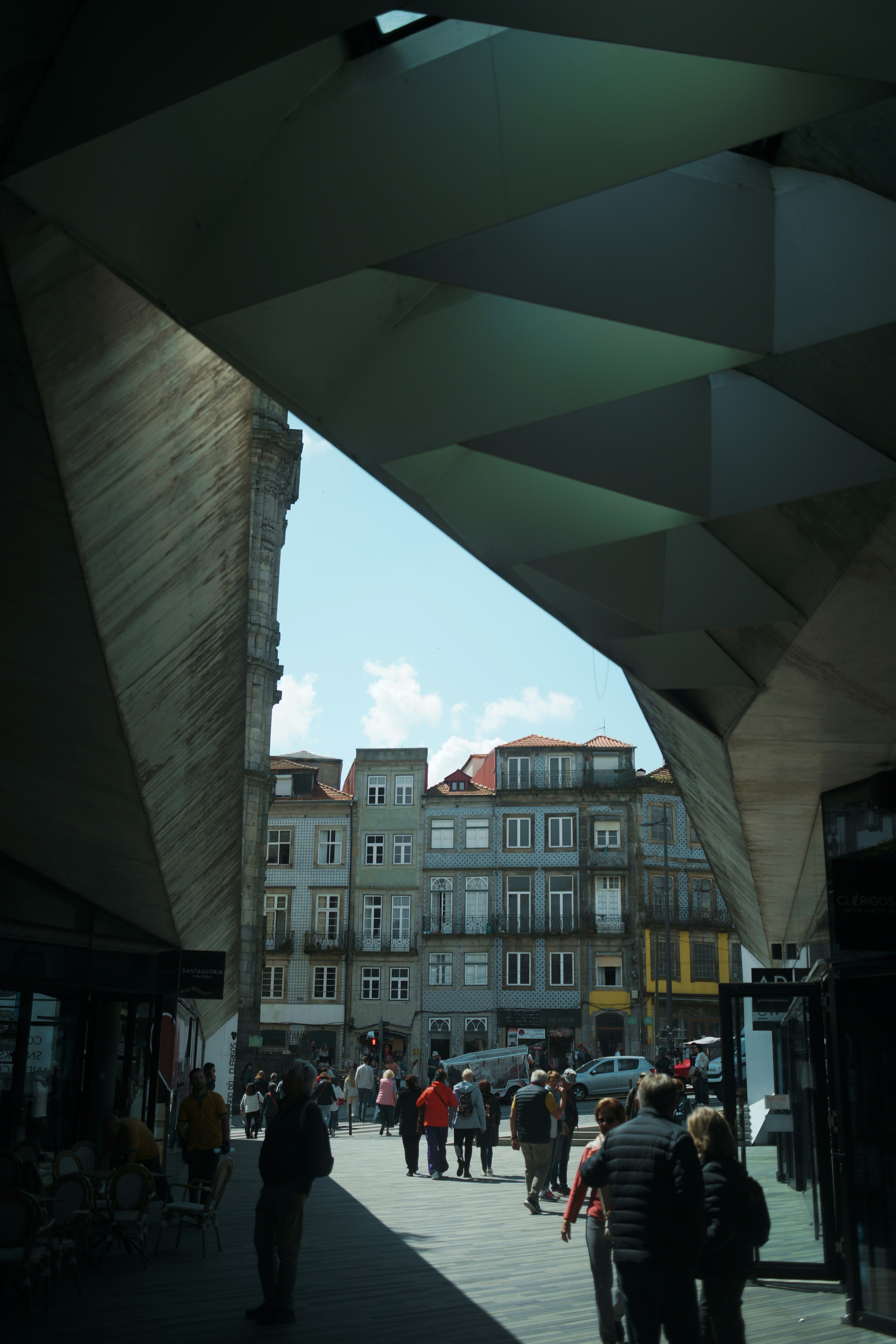 Urban Light Spill under a Geometric Arch