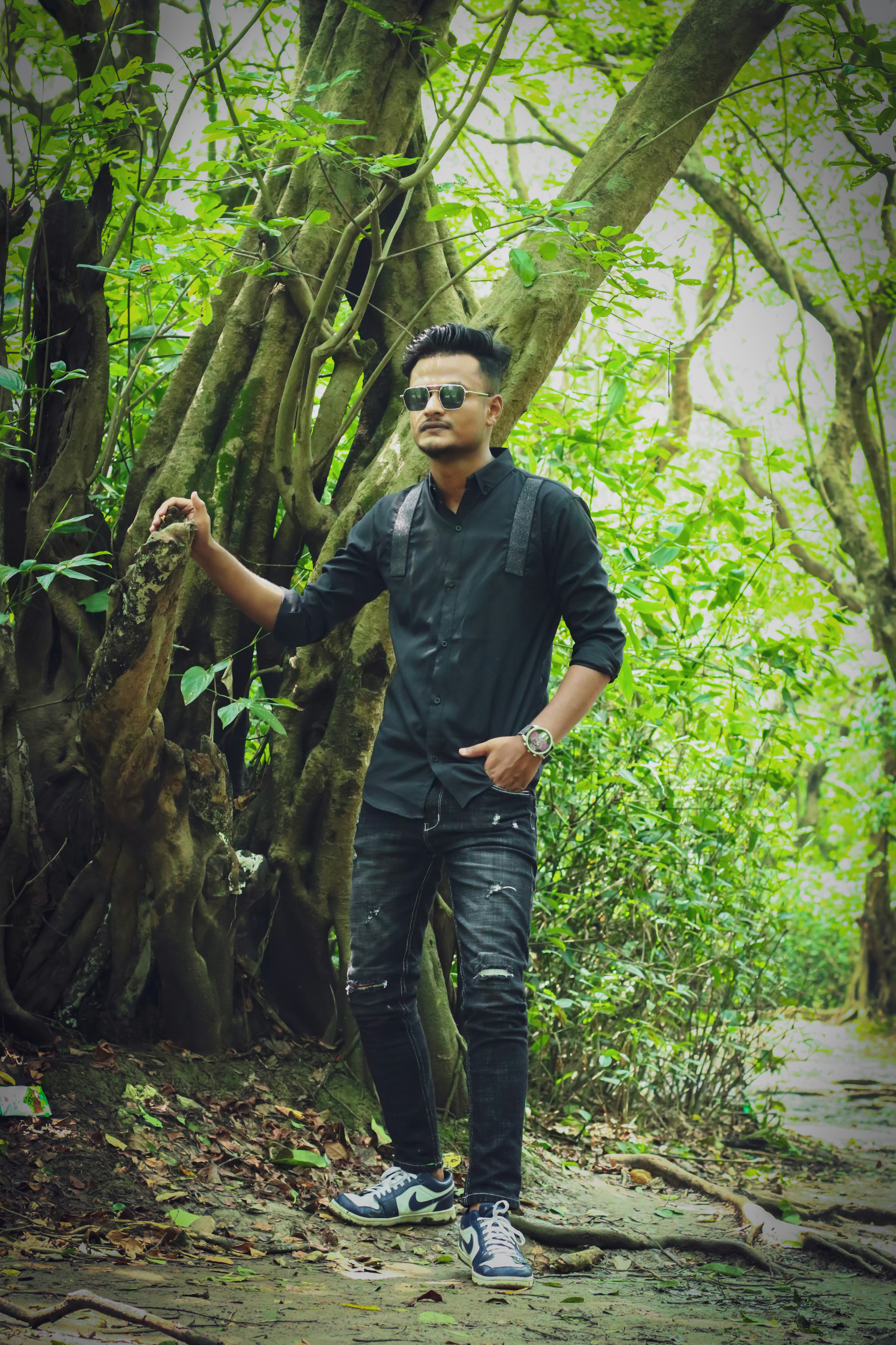 Midway in the Forest: A Night-Styled Portrait Among Giants