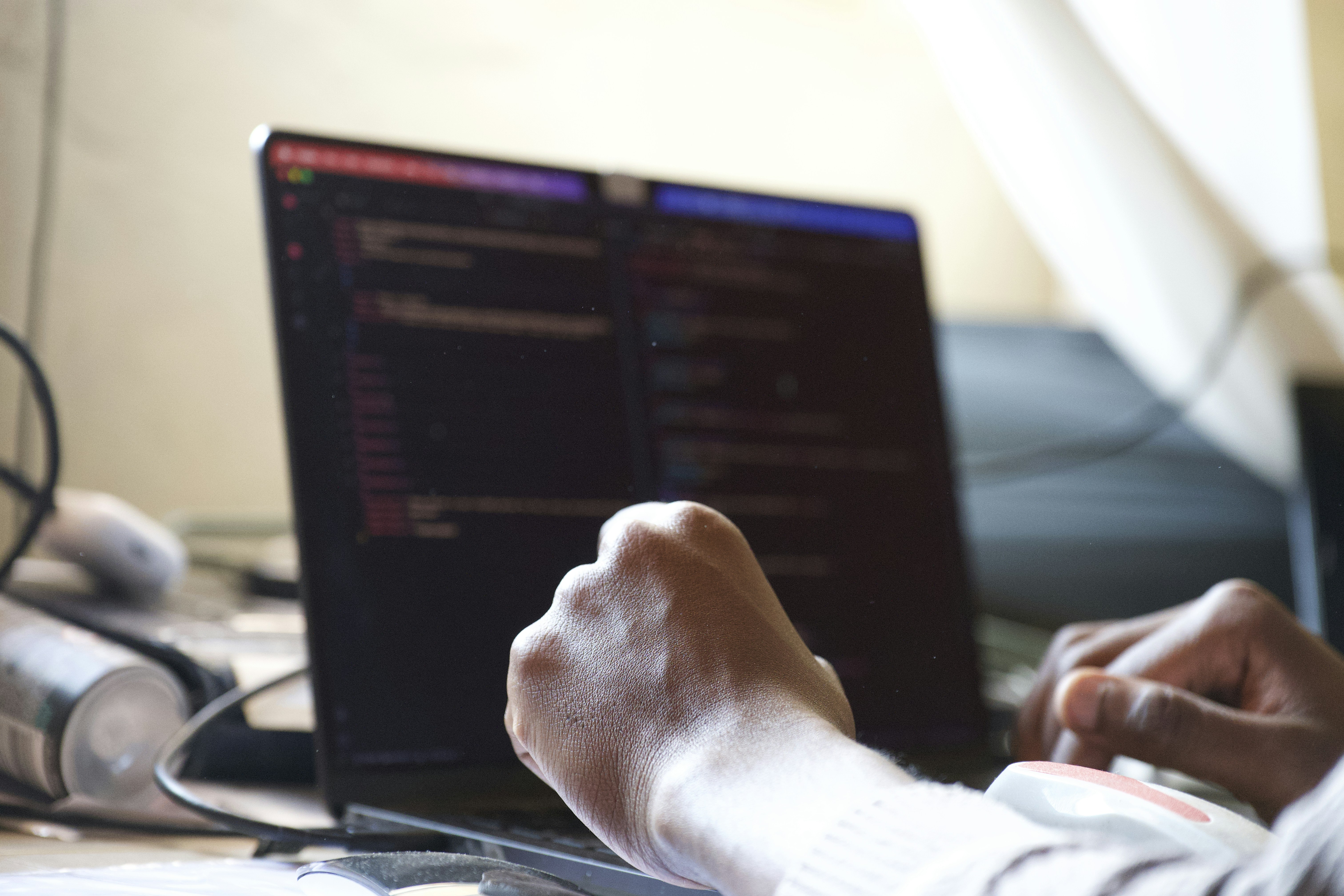 Focused Hands at a Code-Driven Dawn