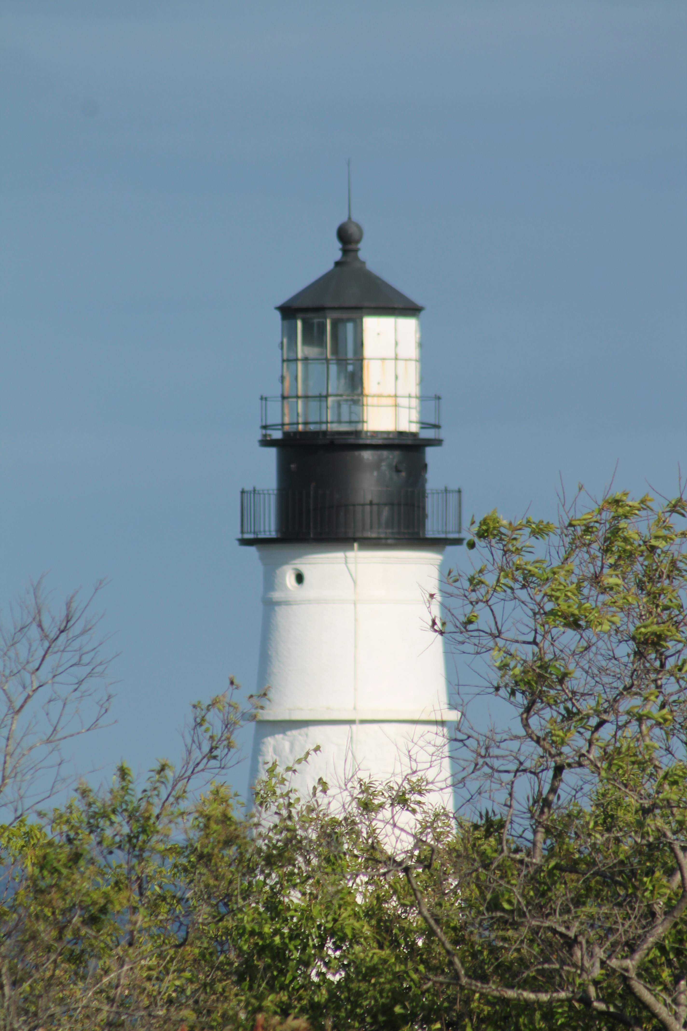 Keeper of the Sea Light: A Coastal Beacon in Quiet Morning