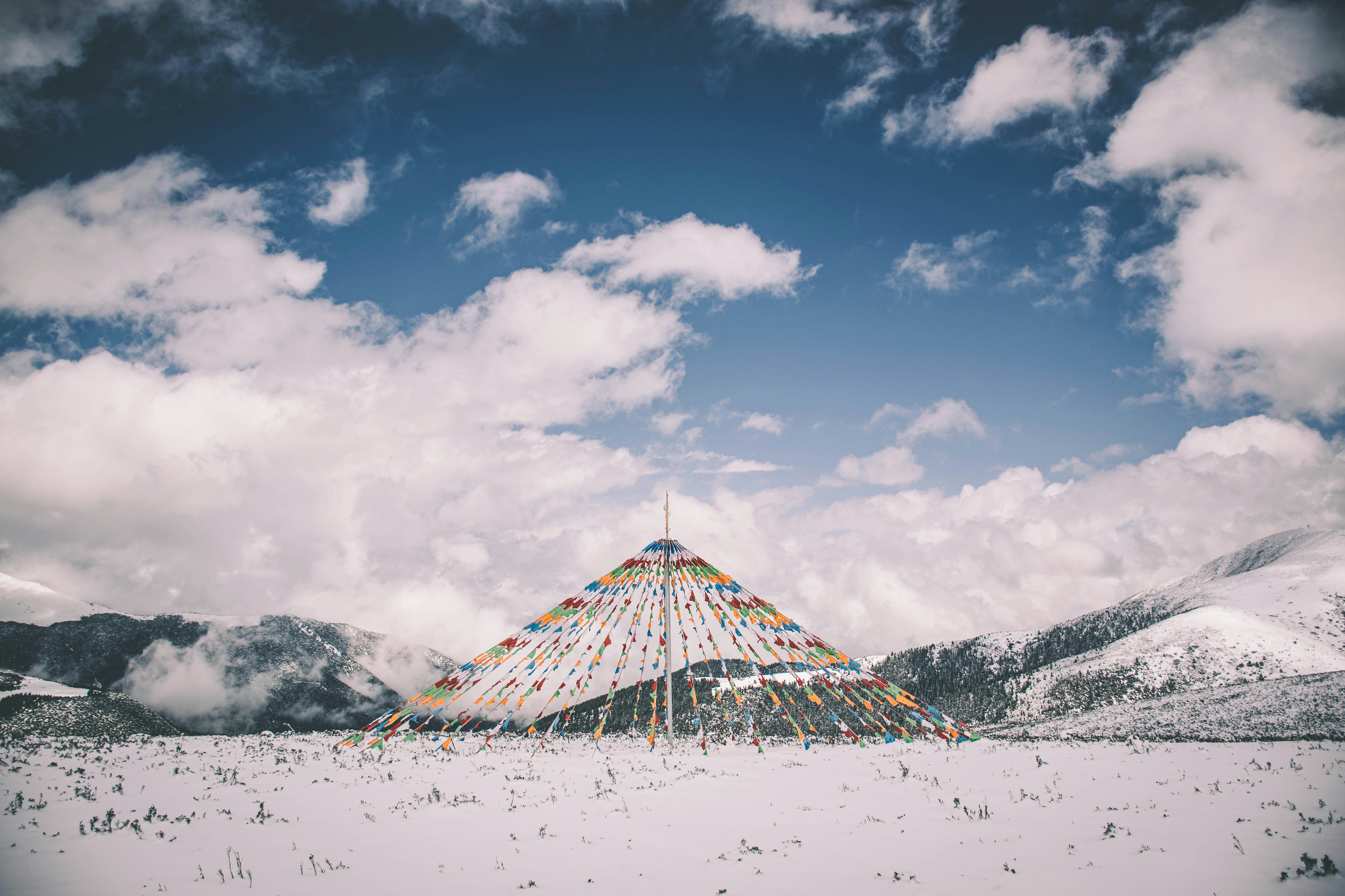 Prayer Flags in the Snow: A Lone Tar-Pavilion Under a Vast Sky