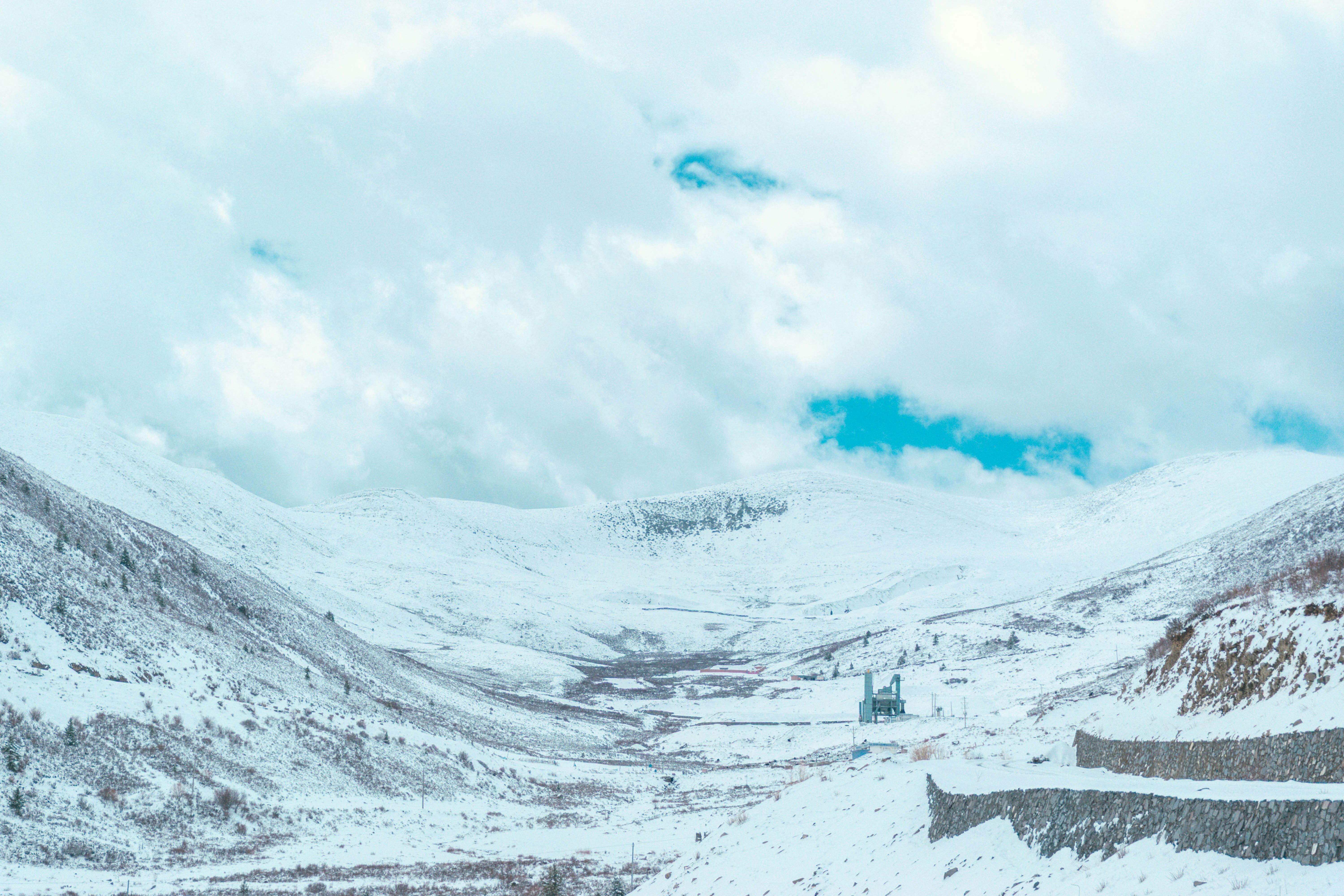 Snowbound Valley: A Quiet Runway Between White Ridges