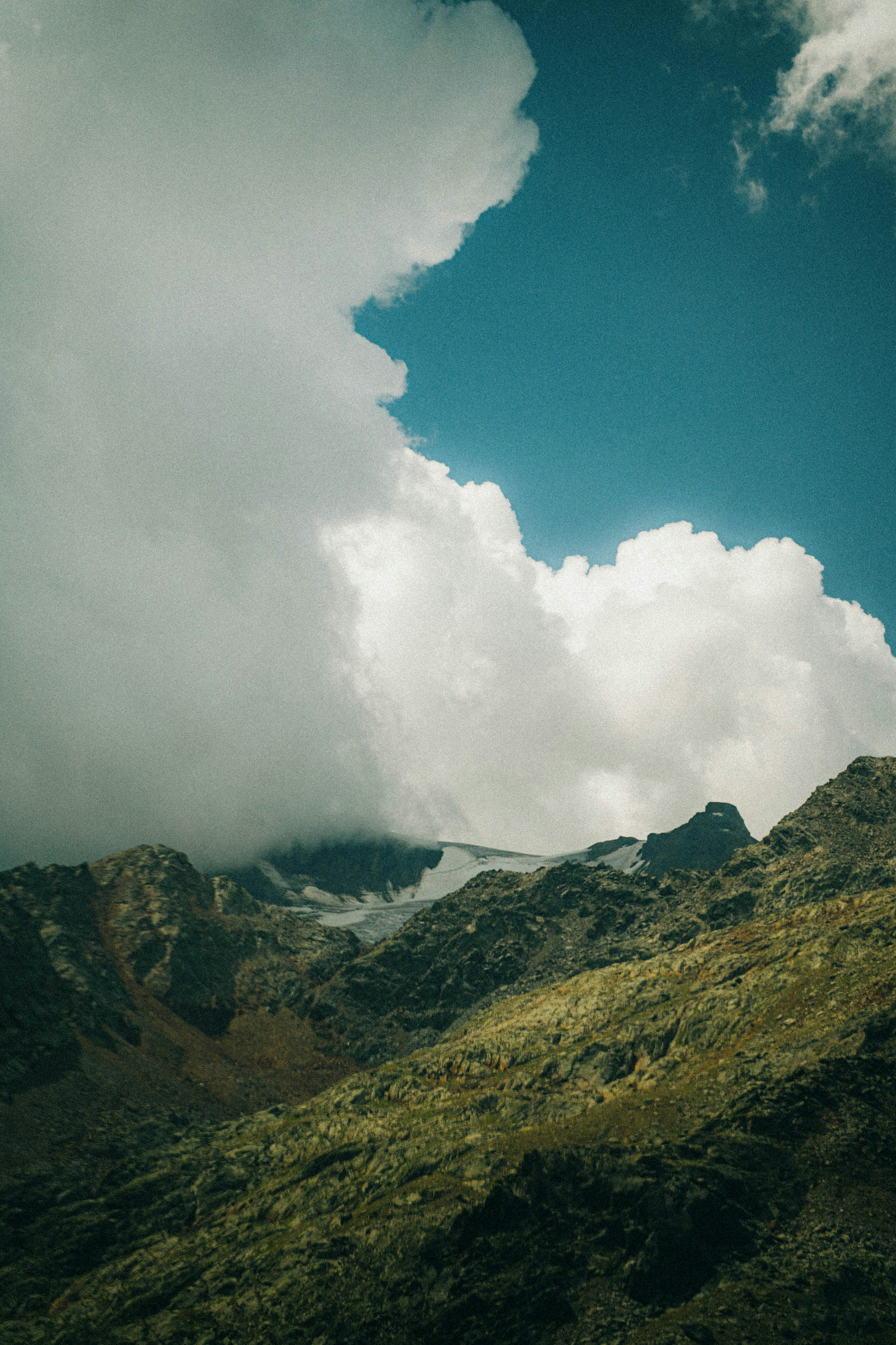 Storm-Chiseled Summit under a Break in the Clouds