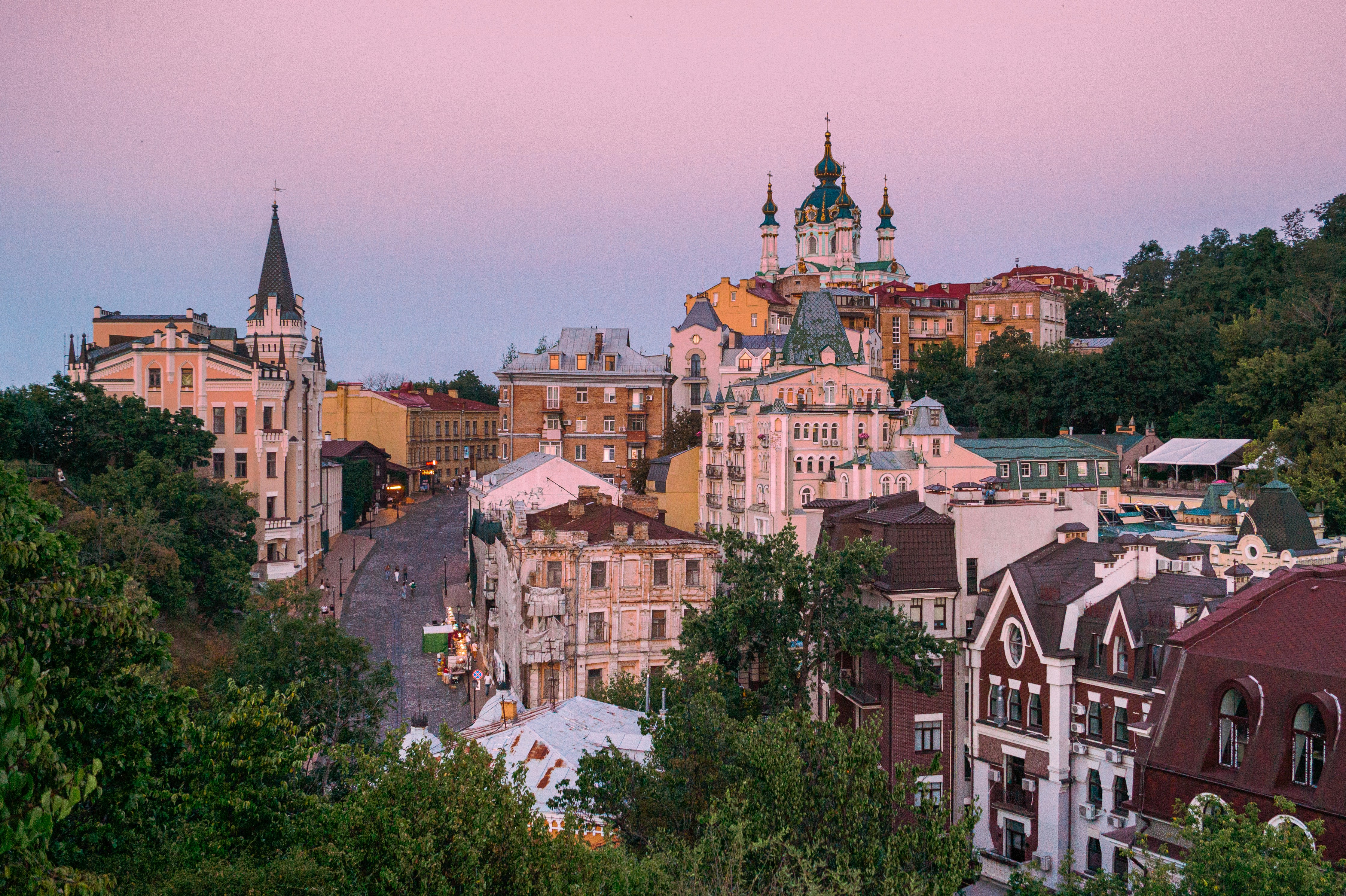  pastel twilight over a hillside European town
