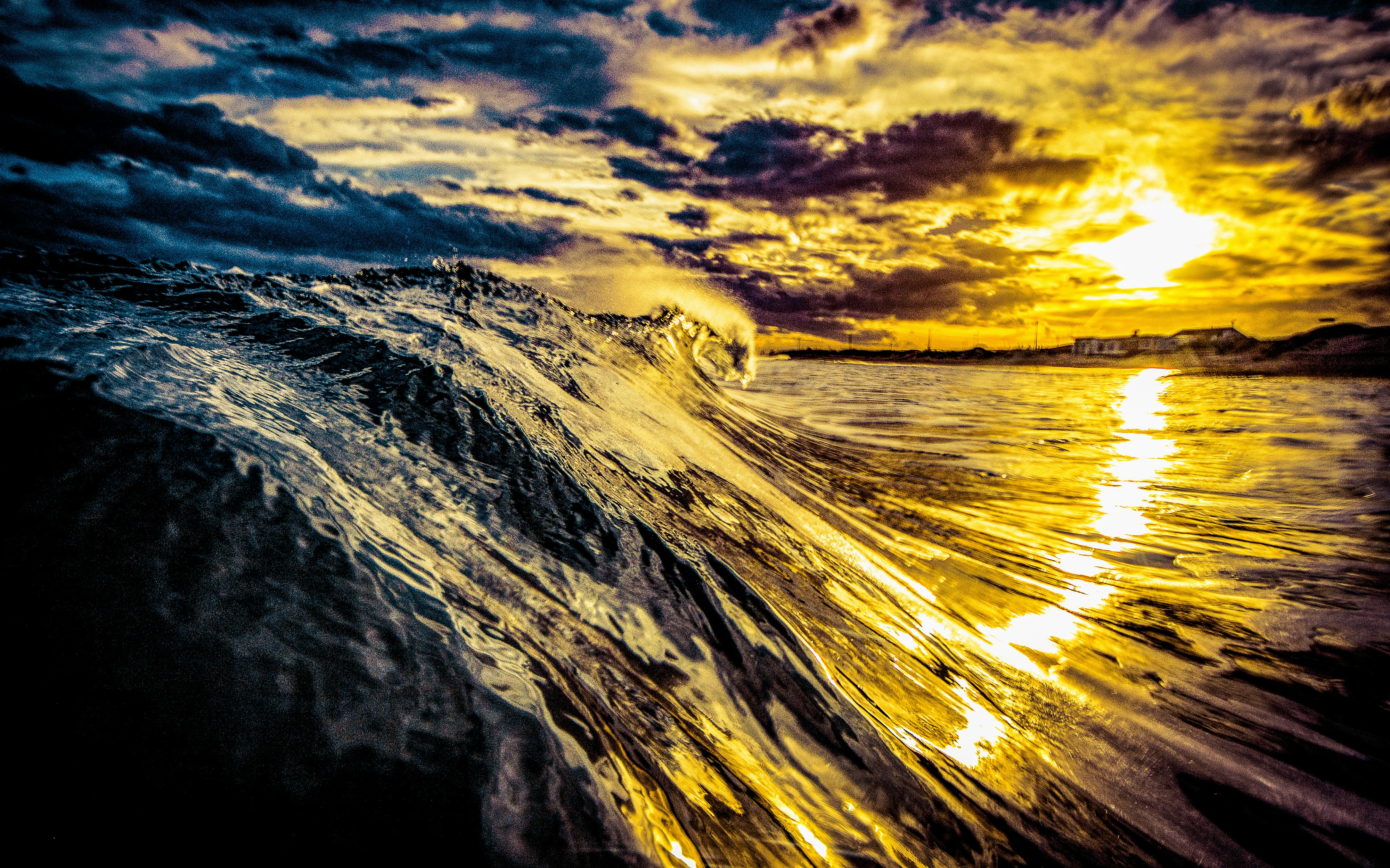 Sunlit Break: A Sky-Glazed Wave Surges Toward a Golden Horizon