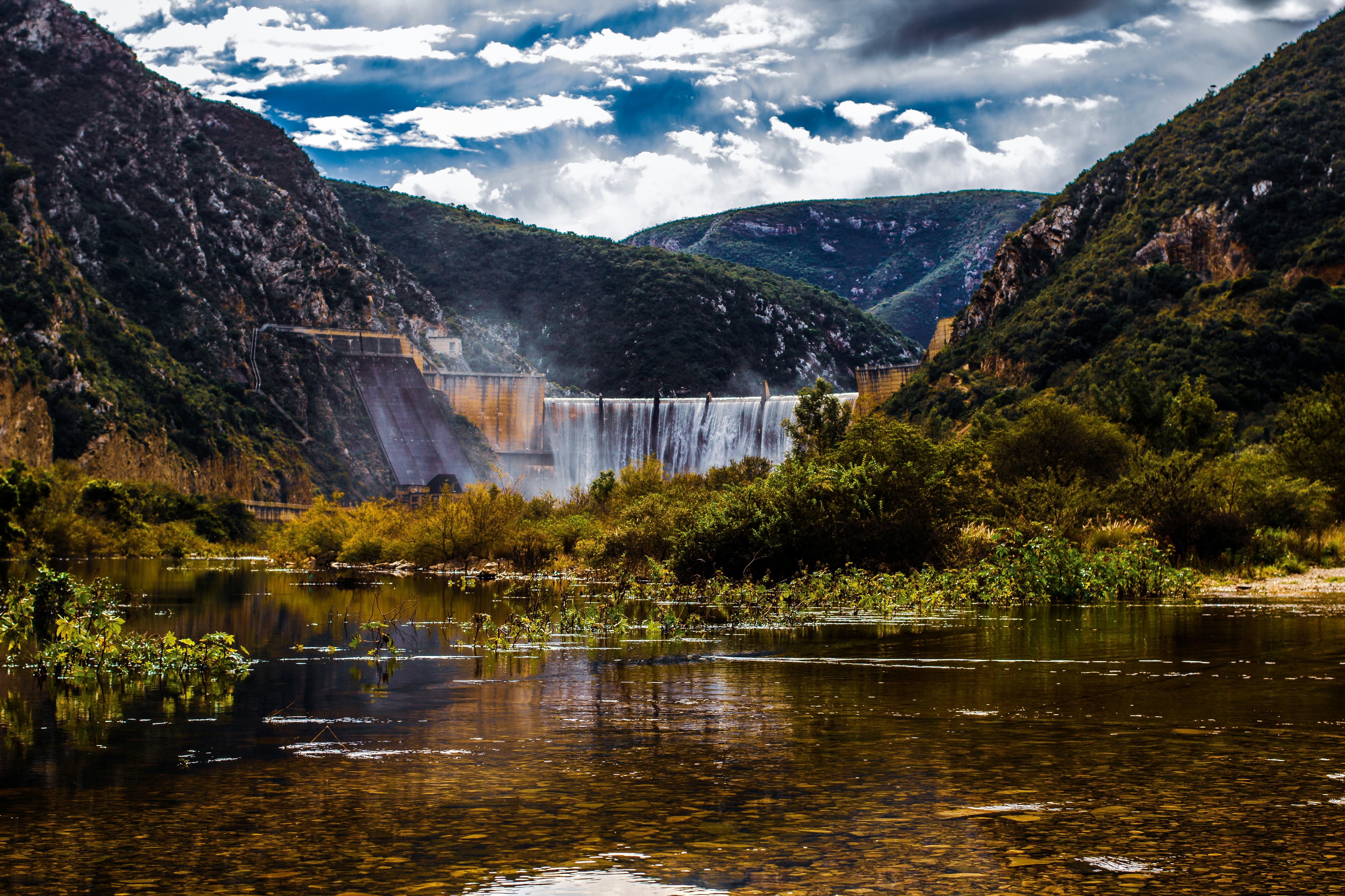 Waterfall Gorge Under a Sky of Punched Clouds
