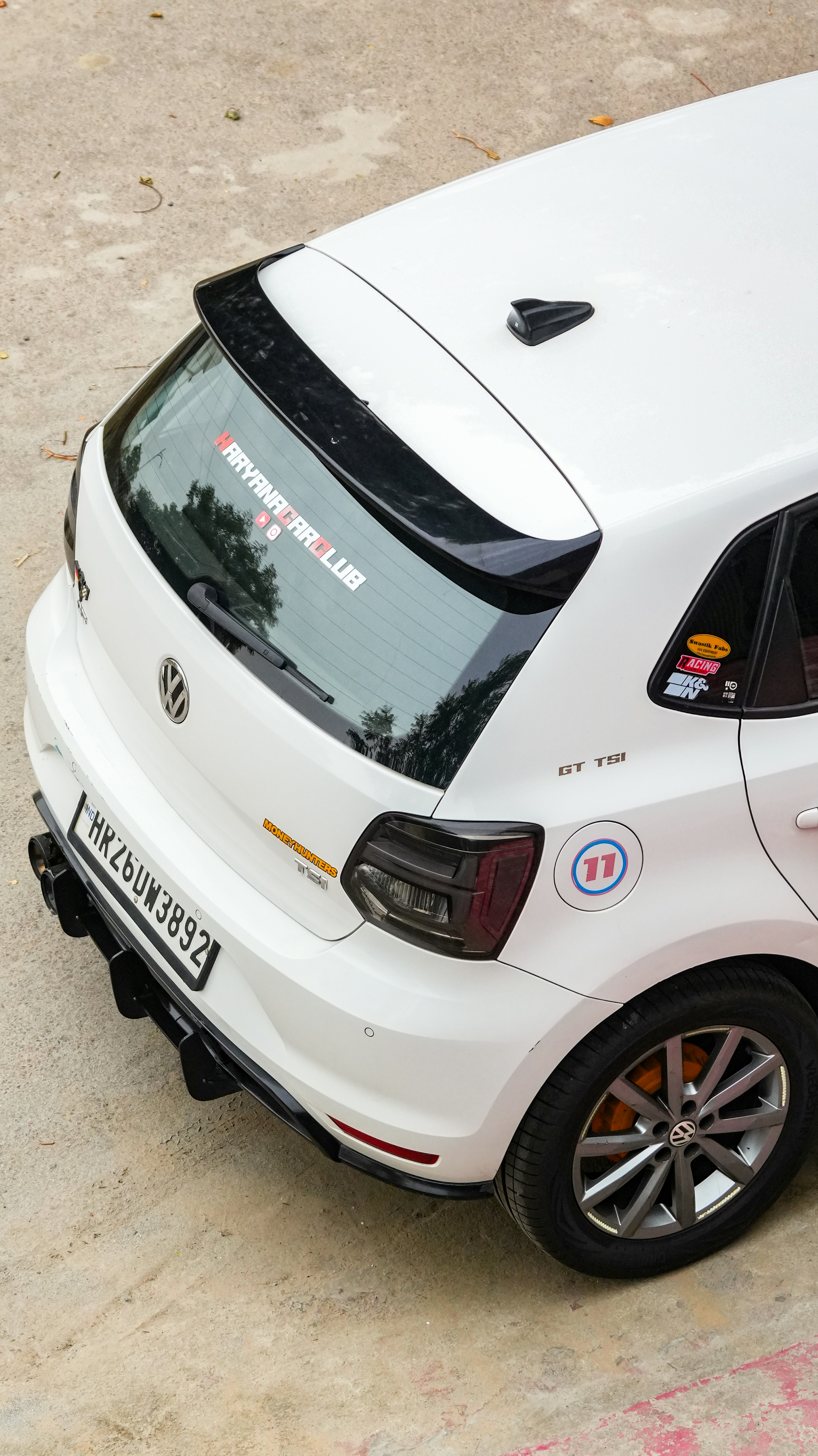 Top-down Look at a White VW GTI Hatch with Racing Livery