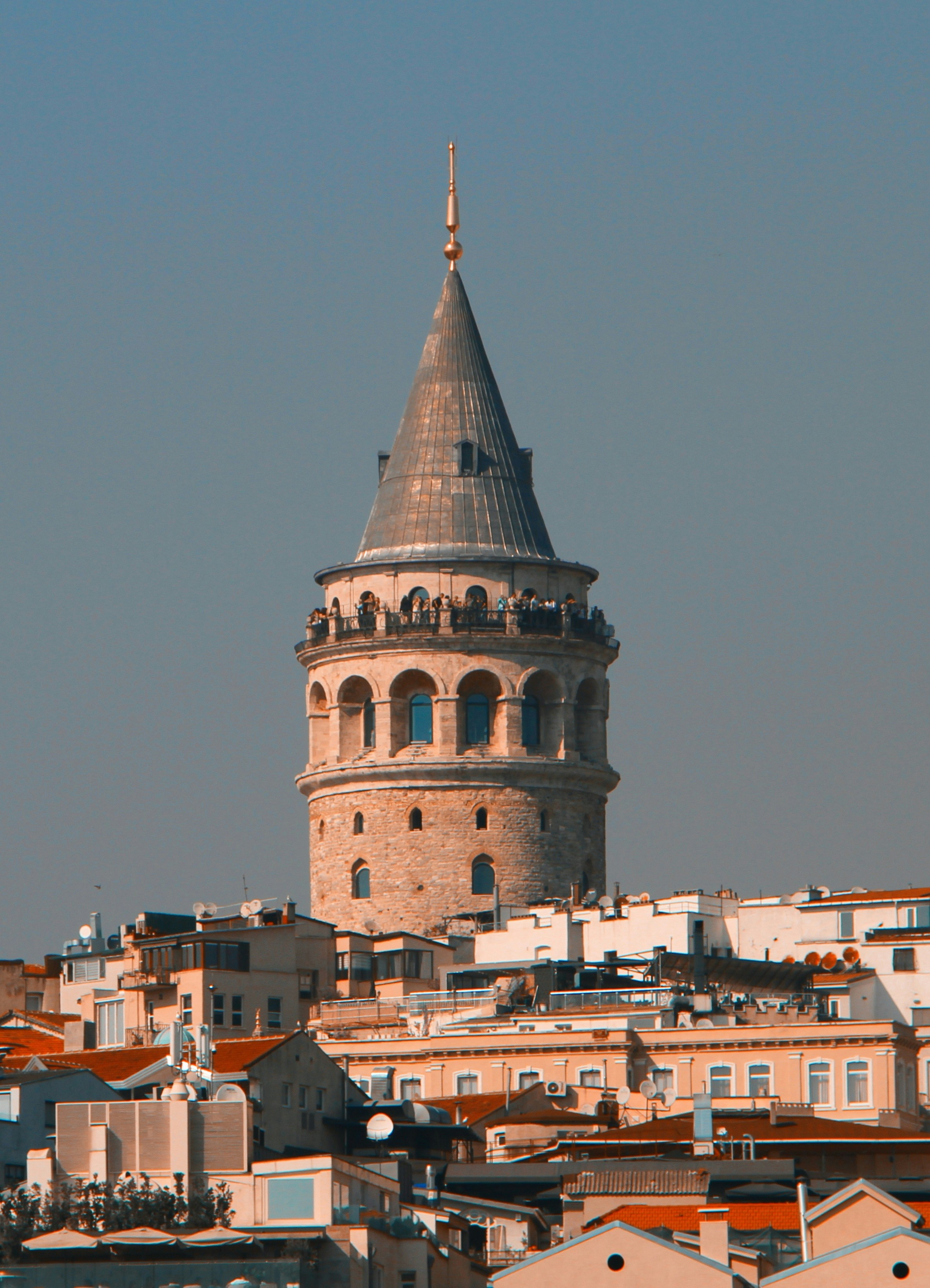 Ottoman-style Watchtower Rises Above a Honey-hued Cityscape