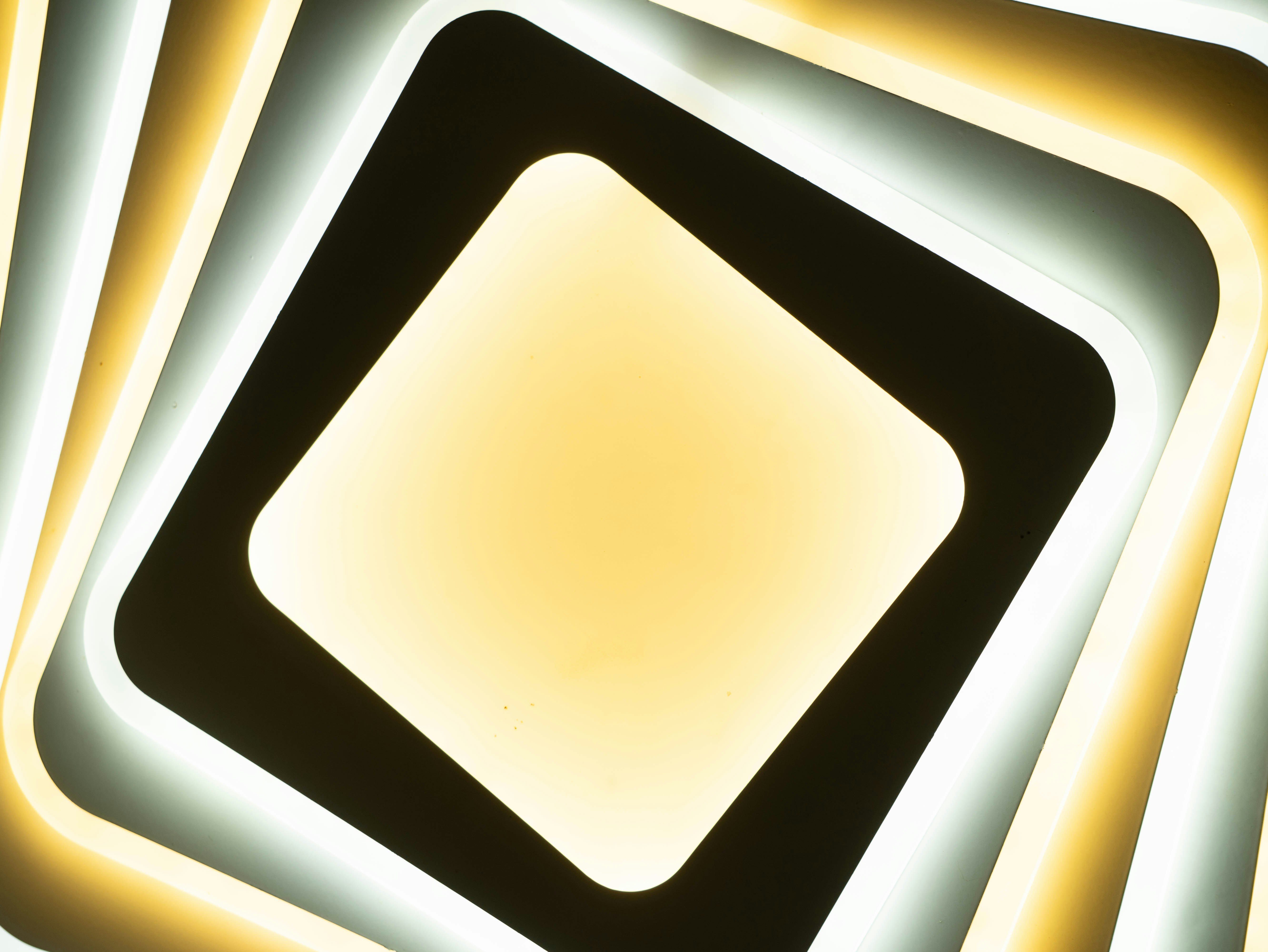 Neon Fractures: Layered Squares in Warm Glow