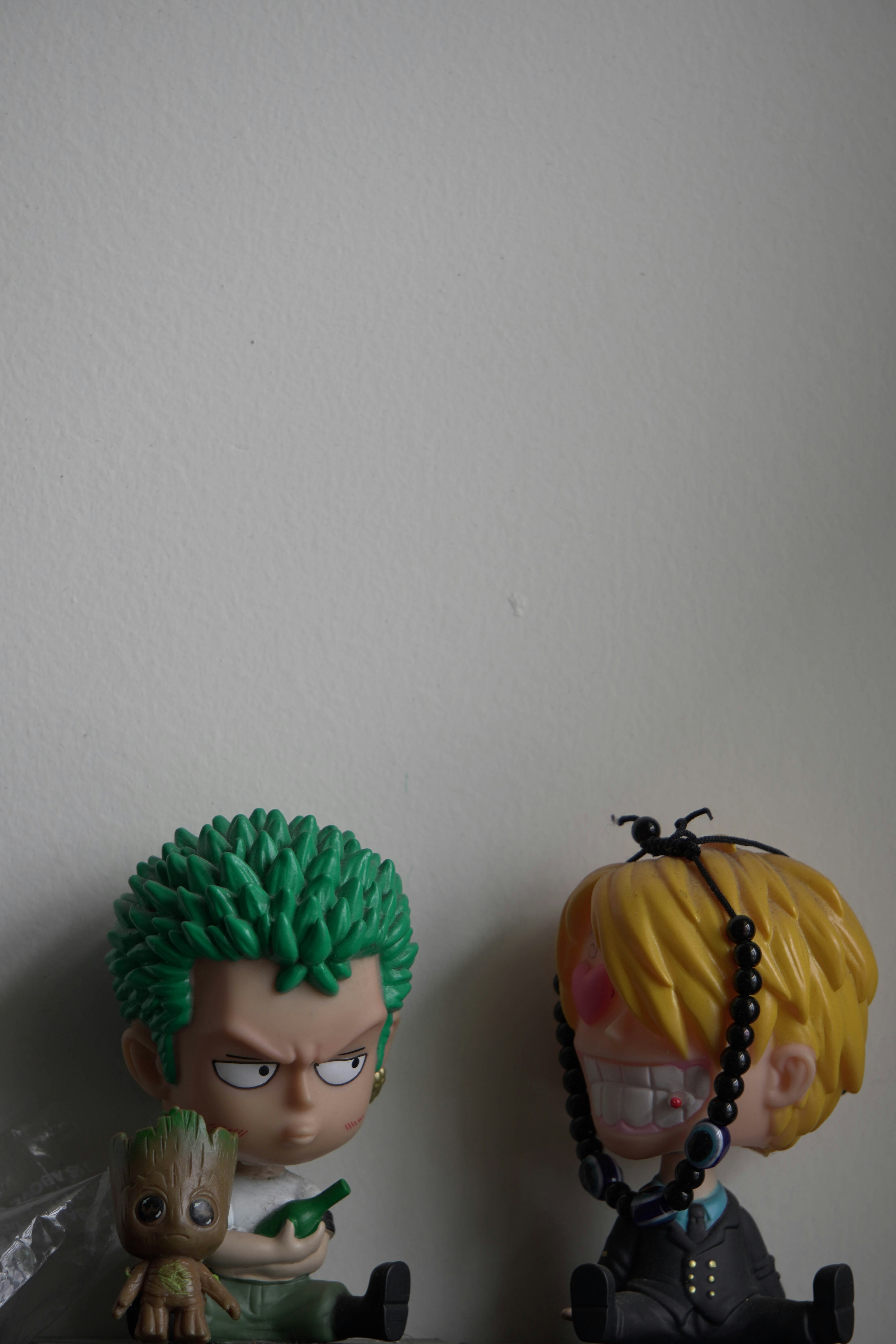 Gnome Guardians: Green-Haired Mischief and Blinking Blonde Boss