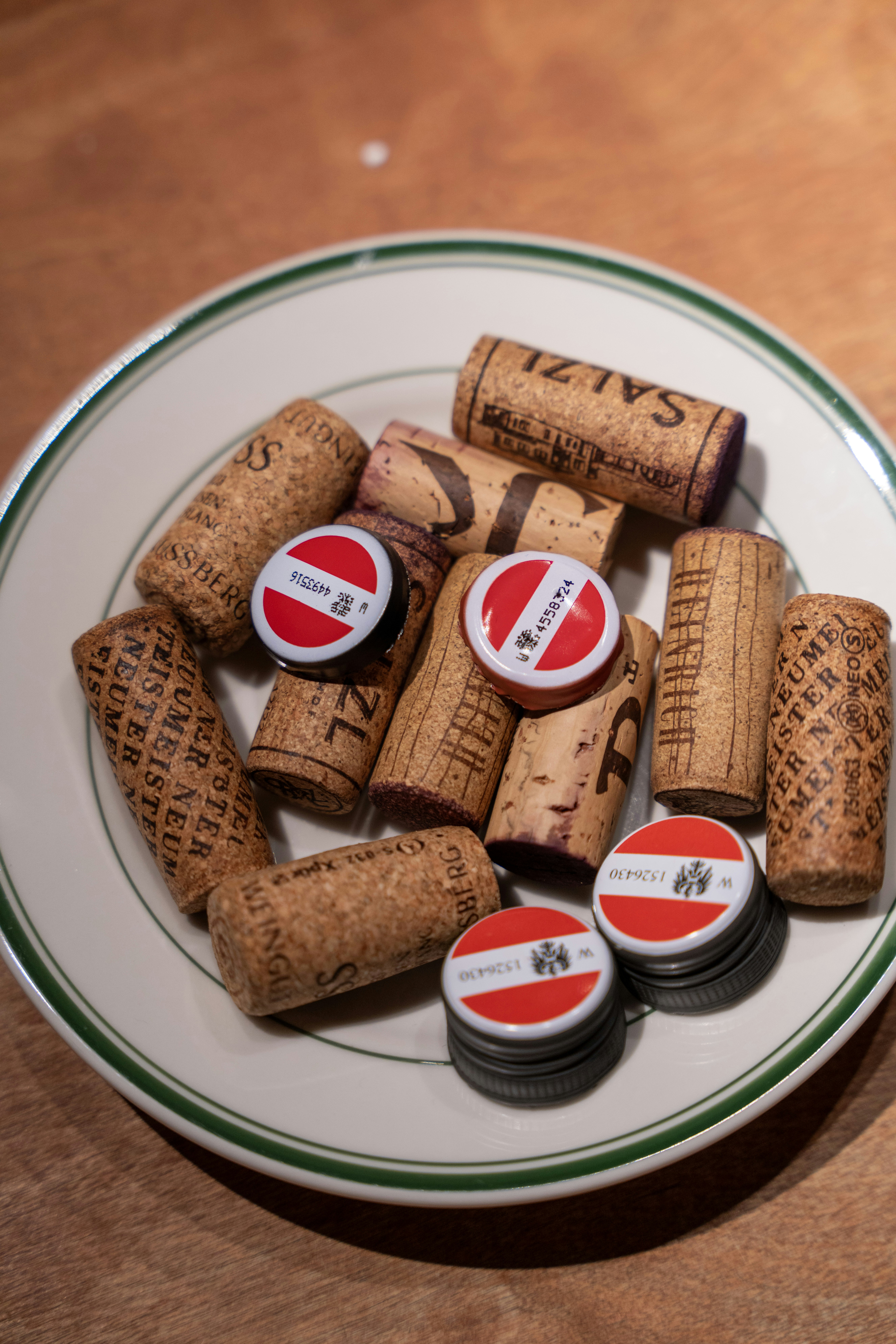 Wine Stoppers in a Circular Gallery: Corks and Caps on a Plate