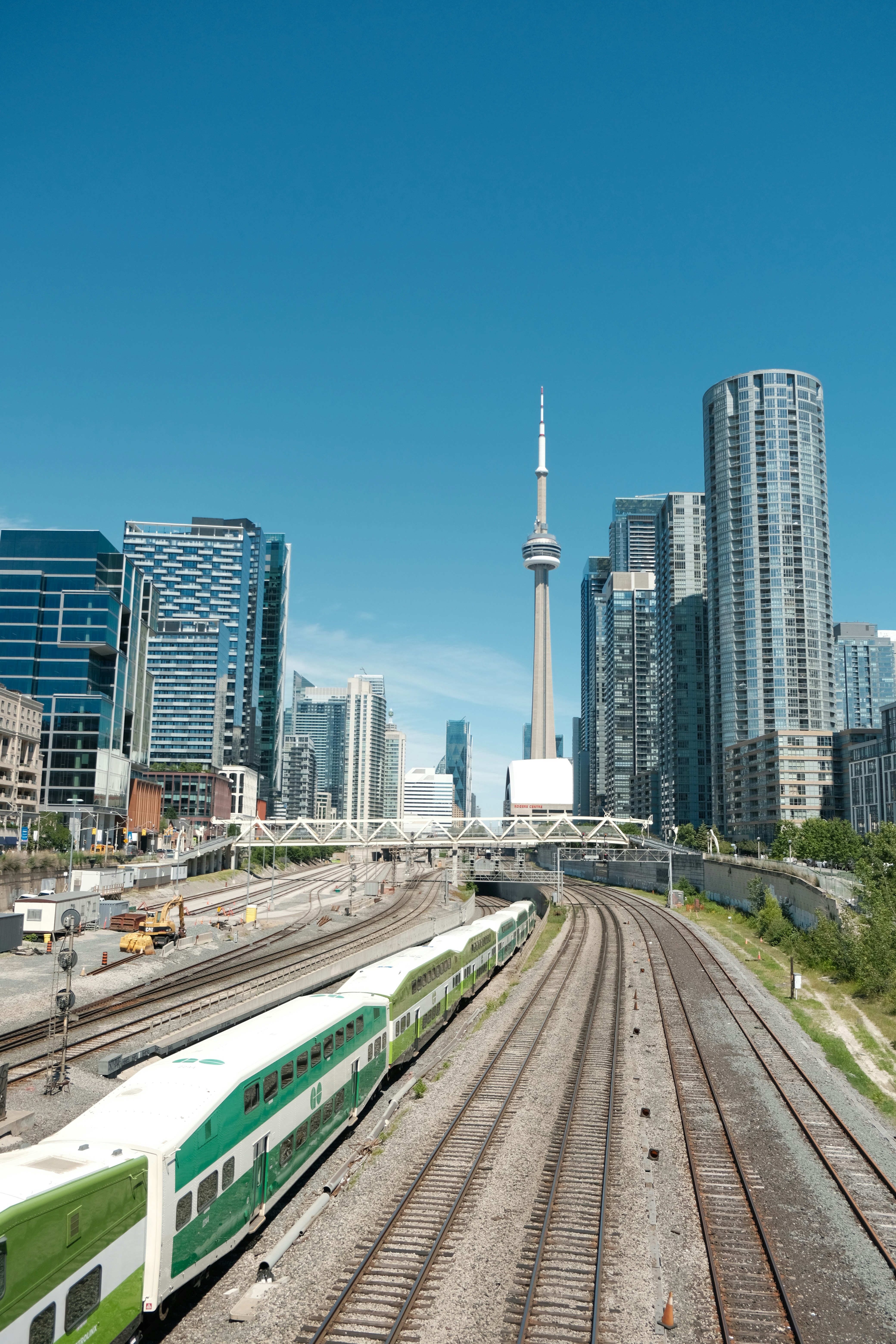 Track Toward the Cathedral of Glass: Toronto Skyline Over Rails