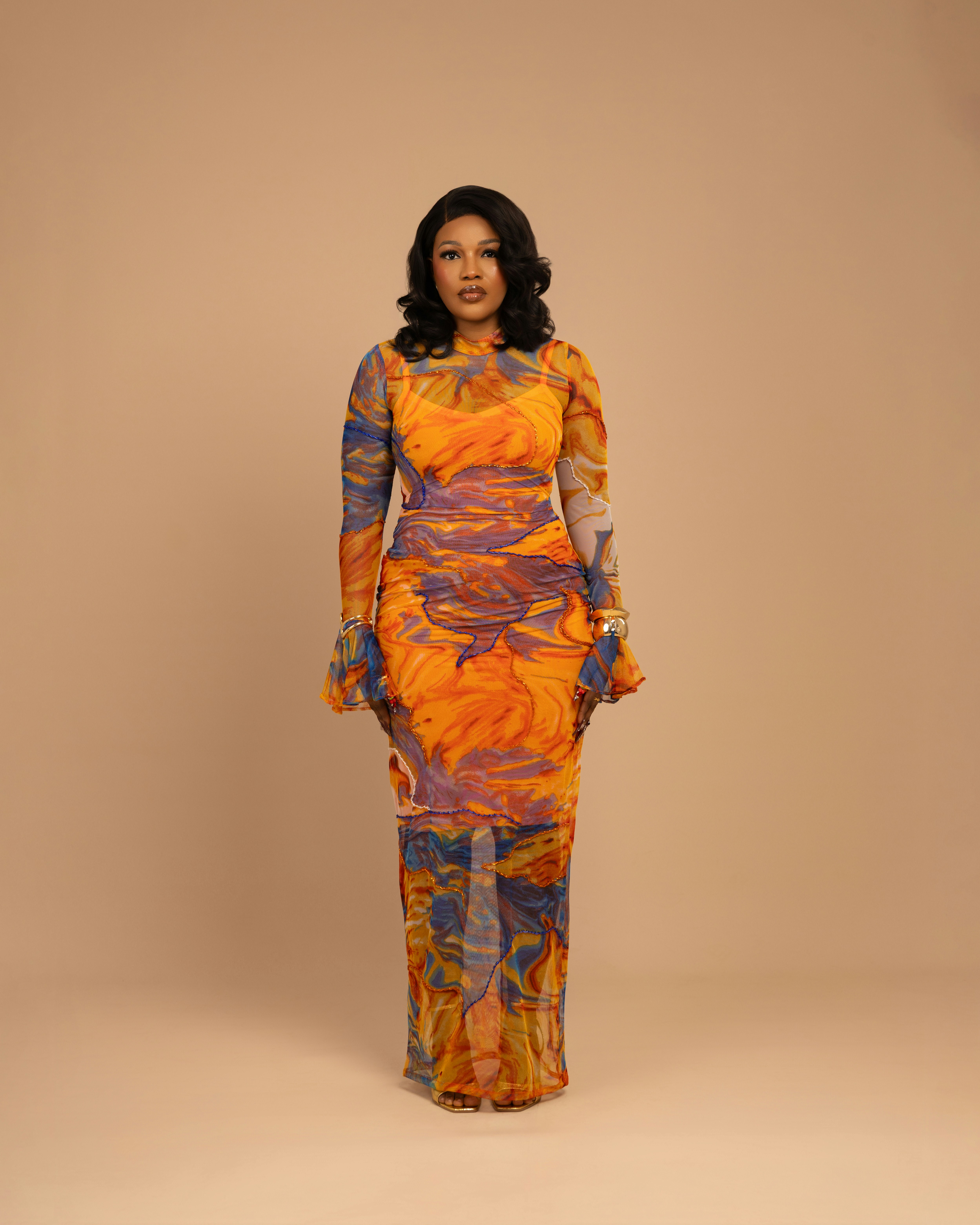 Vivid Orange Portrait: Elegance in a Swirl of Color