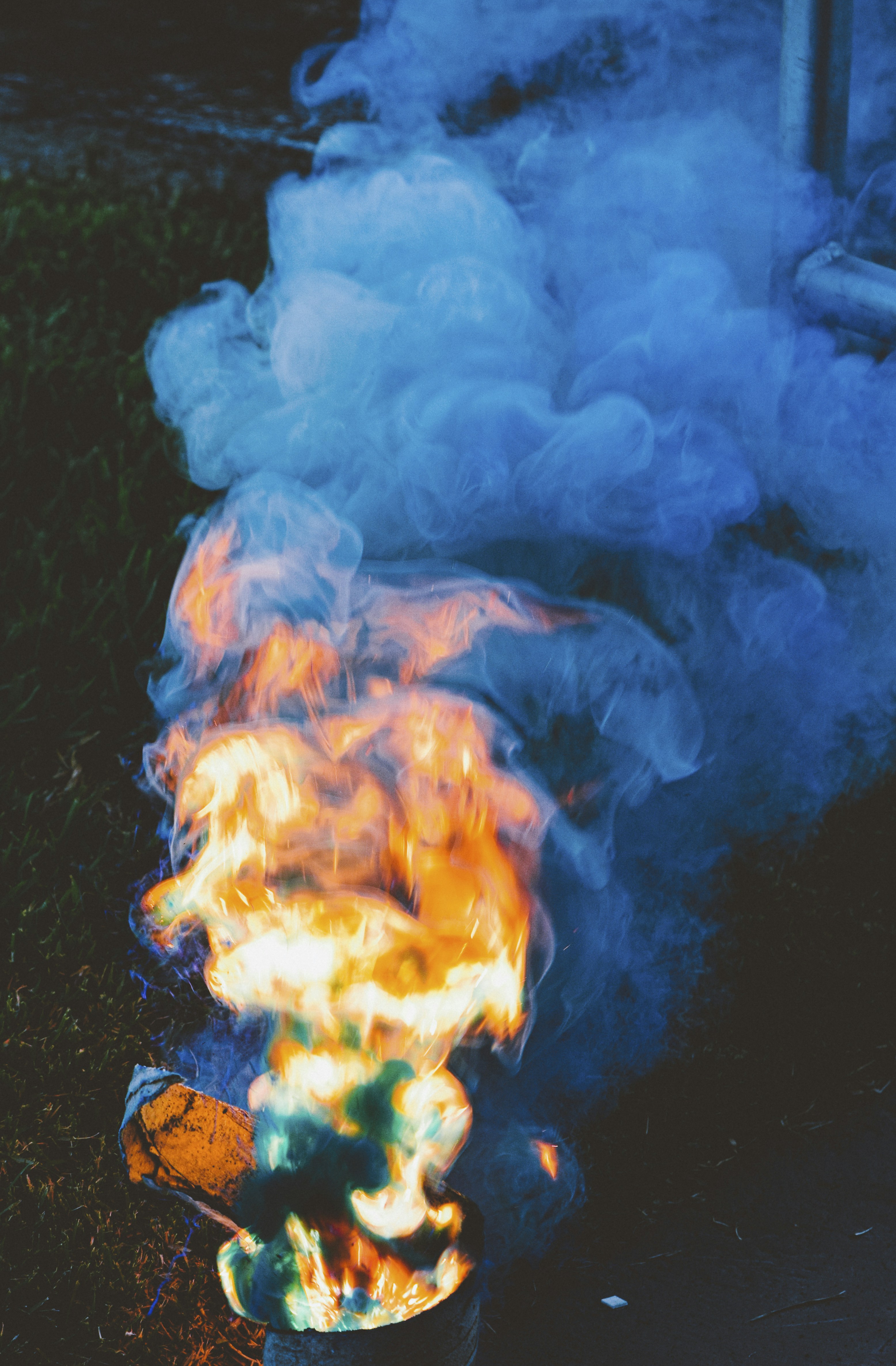 Shaft of Flame in Blue Smoke