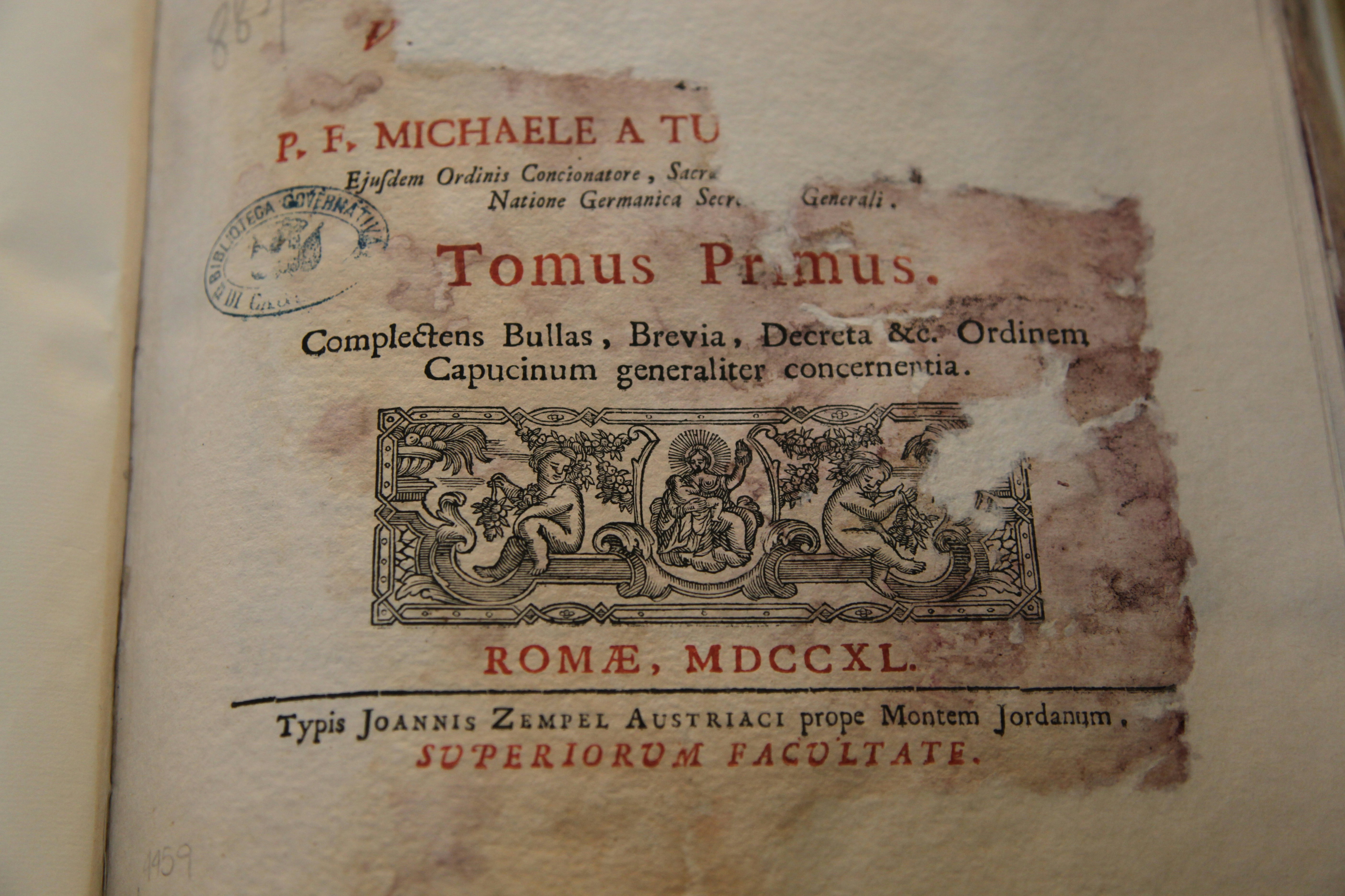 Inscribed Heritage: A Fragment of Roman-Style Emblem on a Weathered Title Page