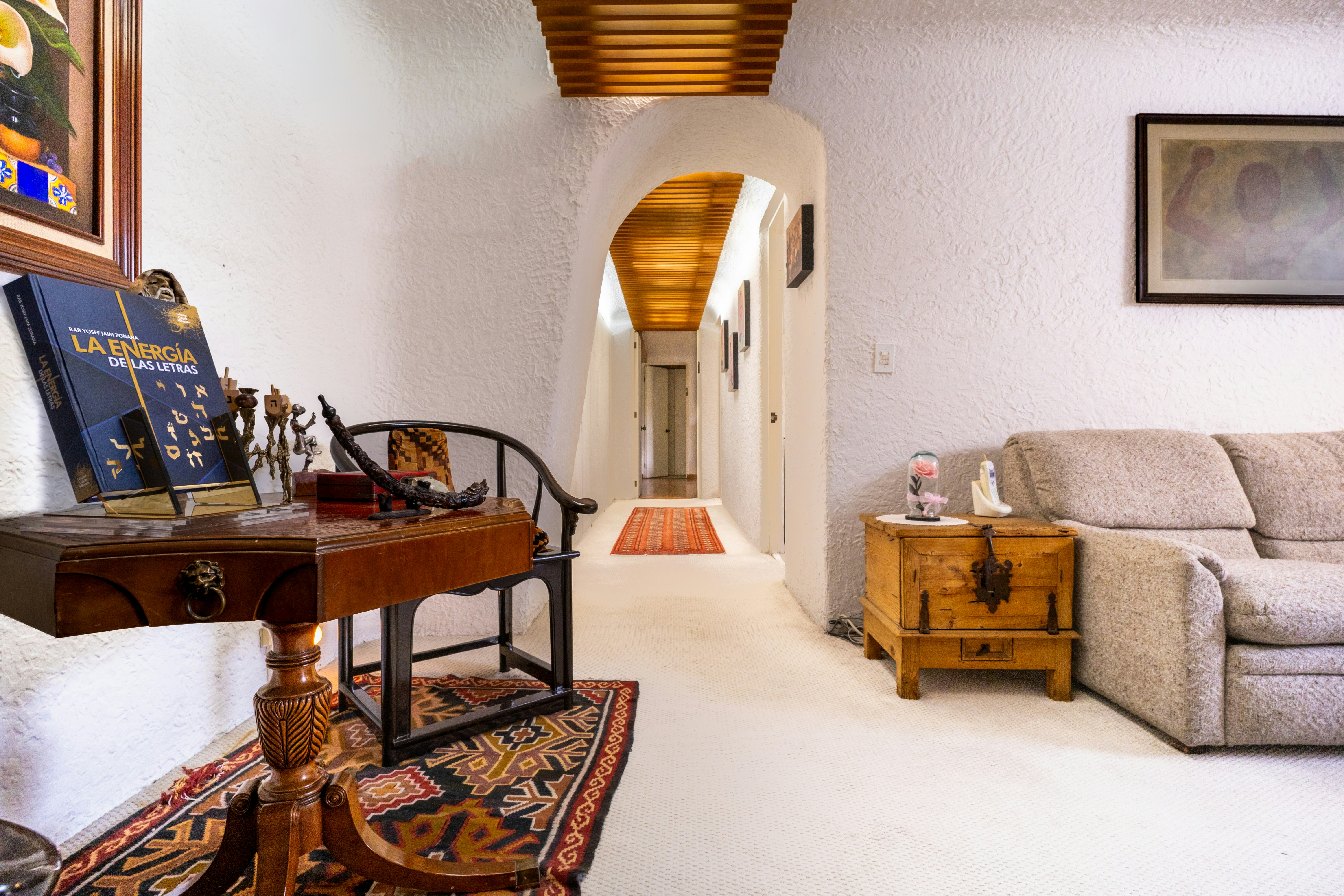 Cozy Vintage Hallway: A Glimpse Through Doorway into Light