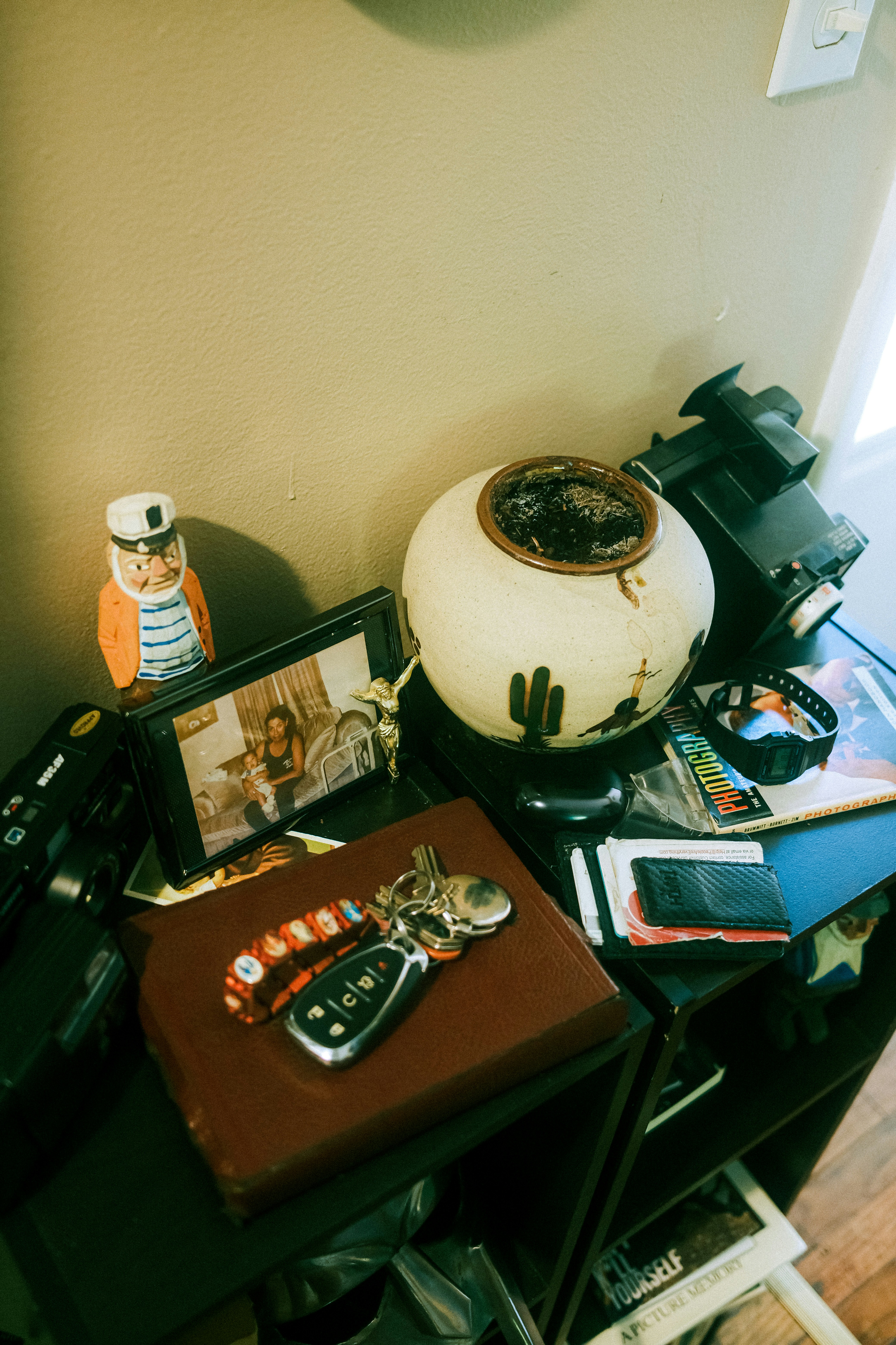 Dusty Keepsakes on a Sunlit Shelf