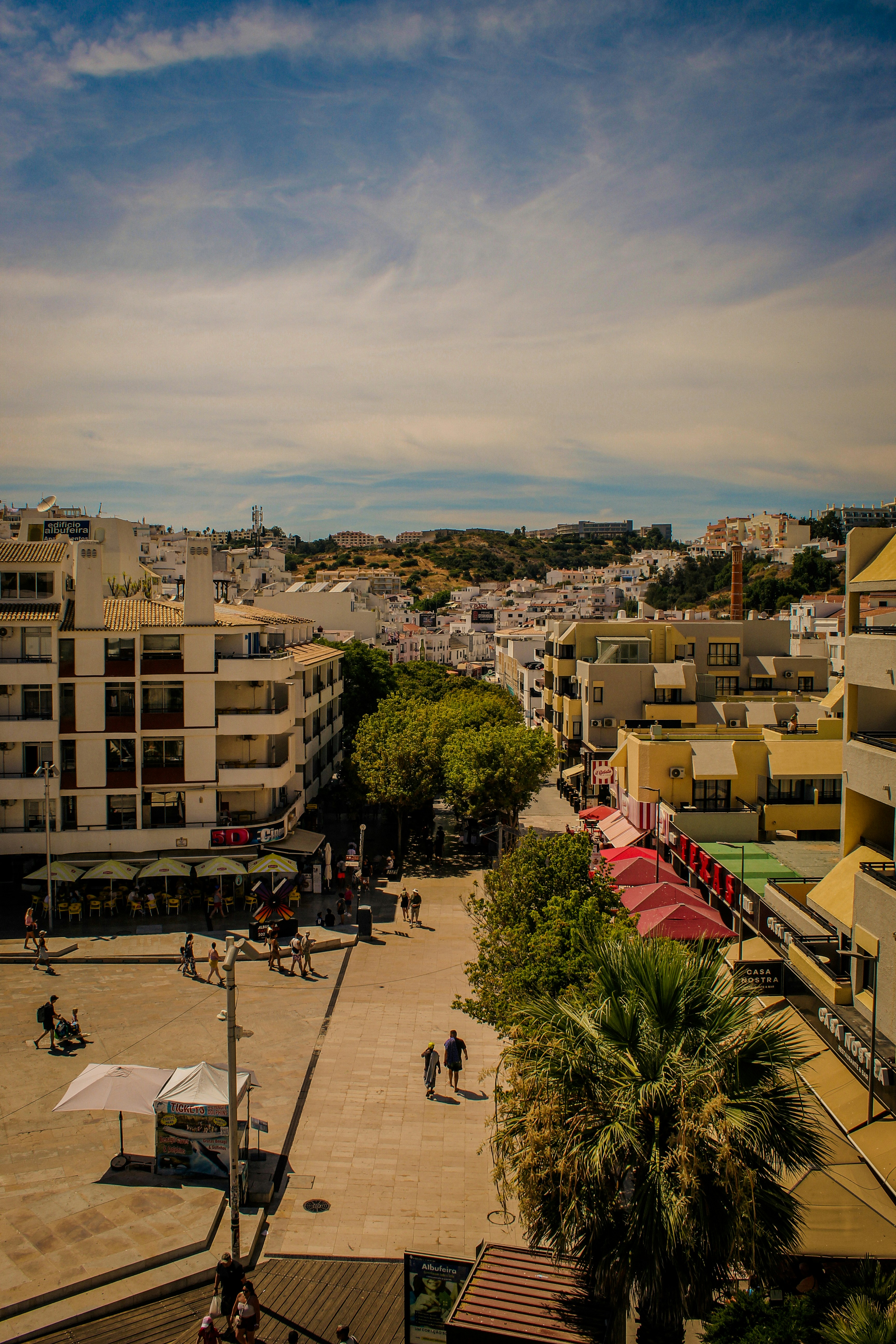 Sunlit Plaza Amid Coastal Townscape
