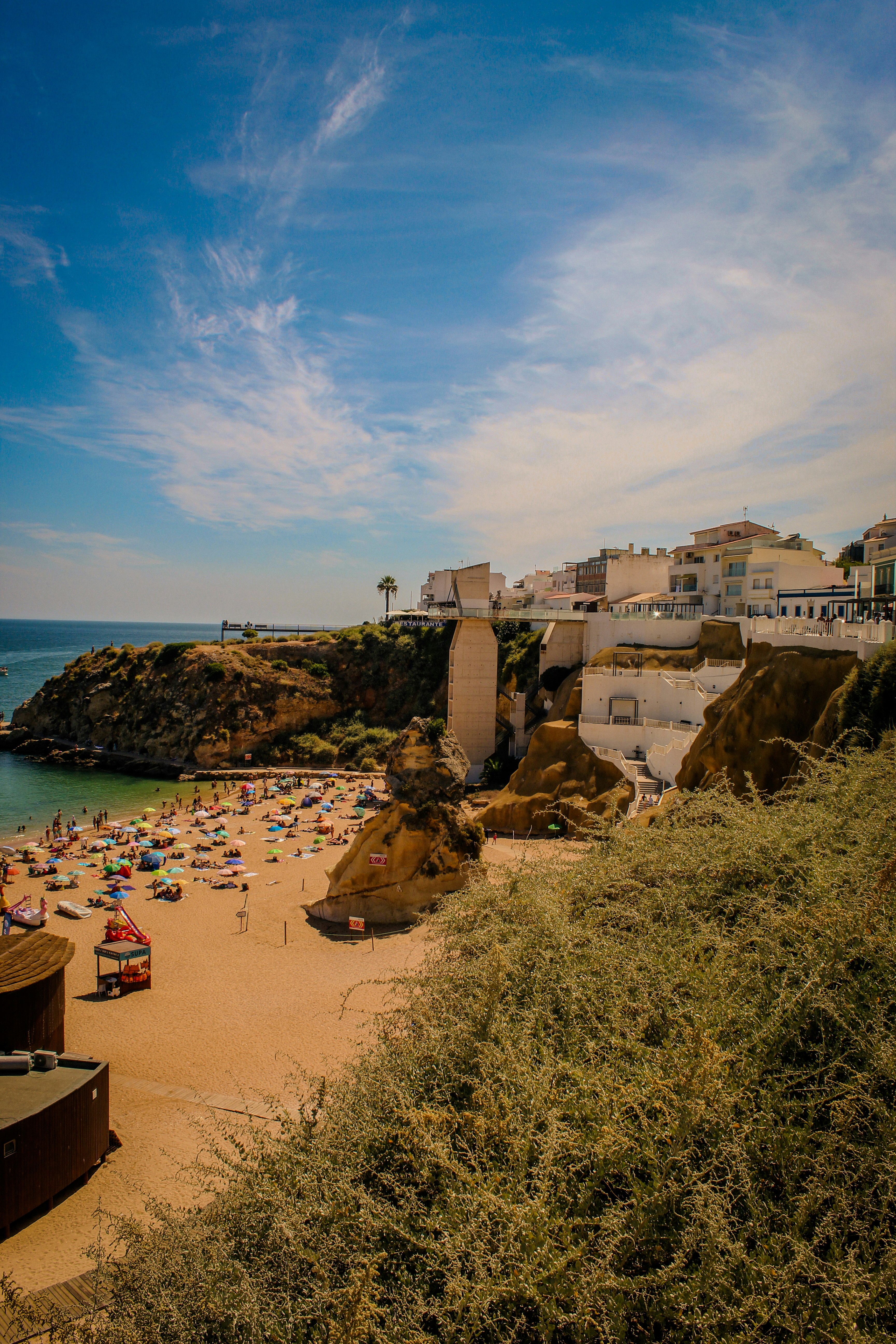 Cliffside Beach Village Beneath Open Skies