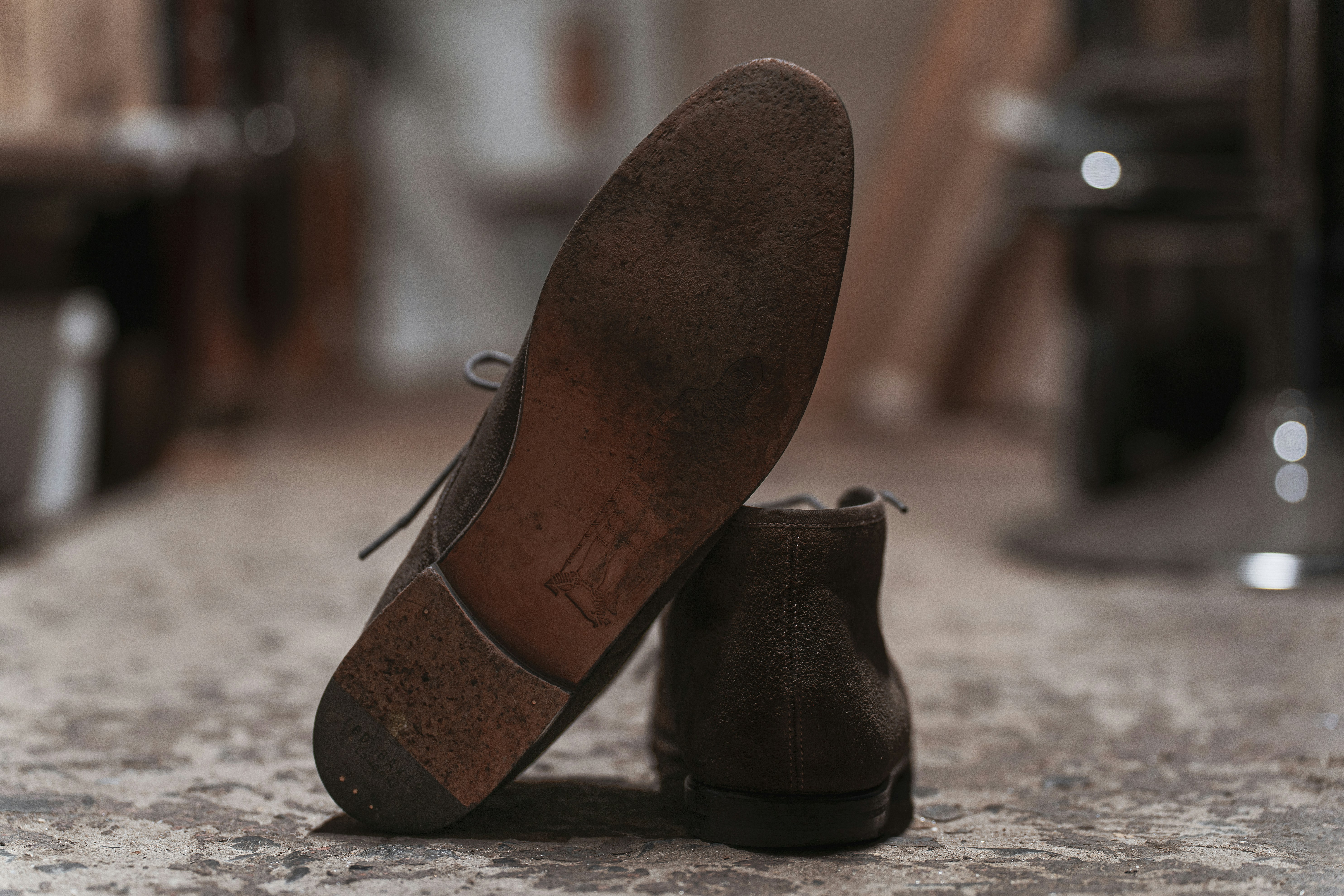 Single boot on a weathered floor: a story of abandoned craft