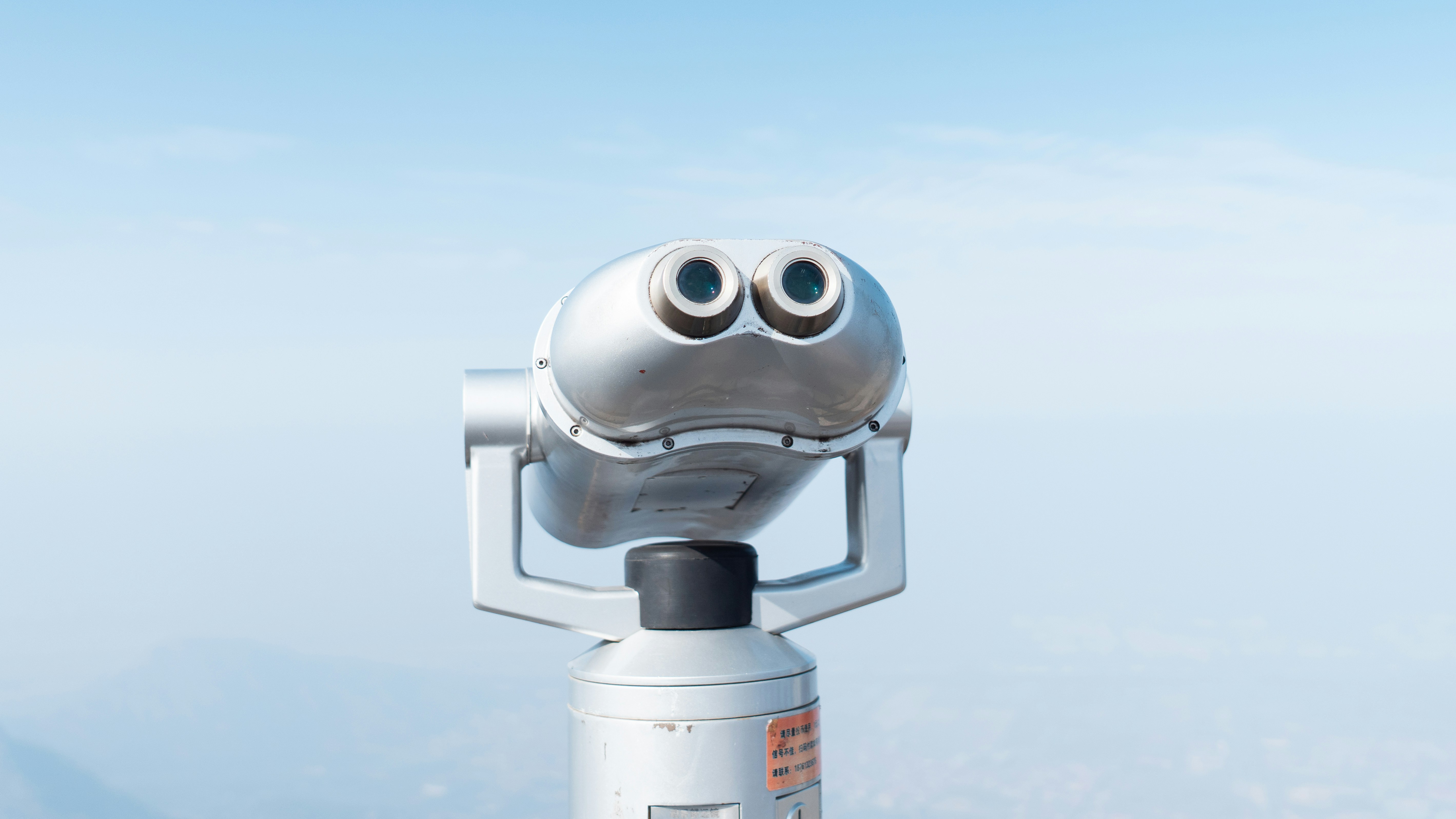Viewer’s Eye on the Street-Side Binoculars: A Coin-Operated Lookout