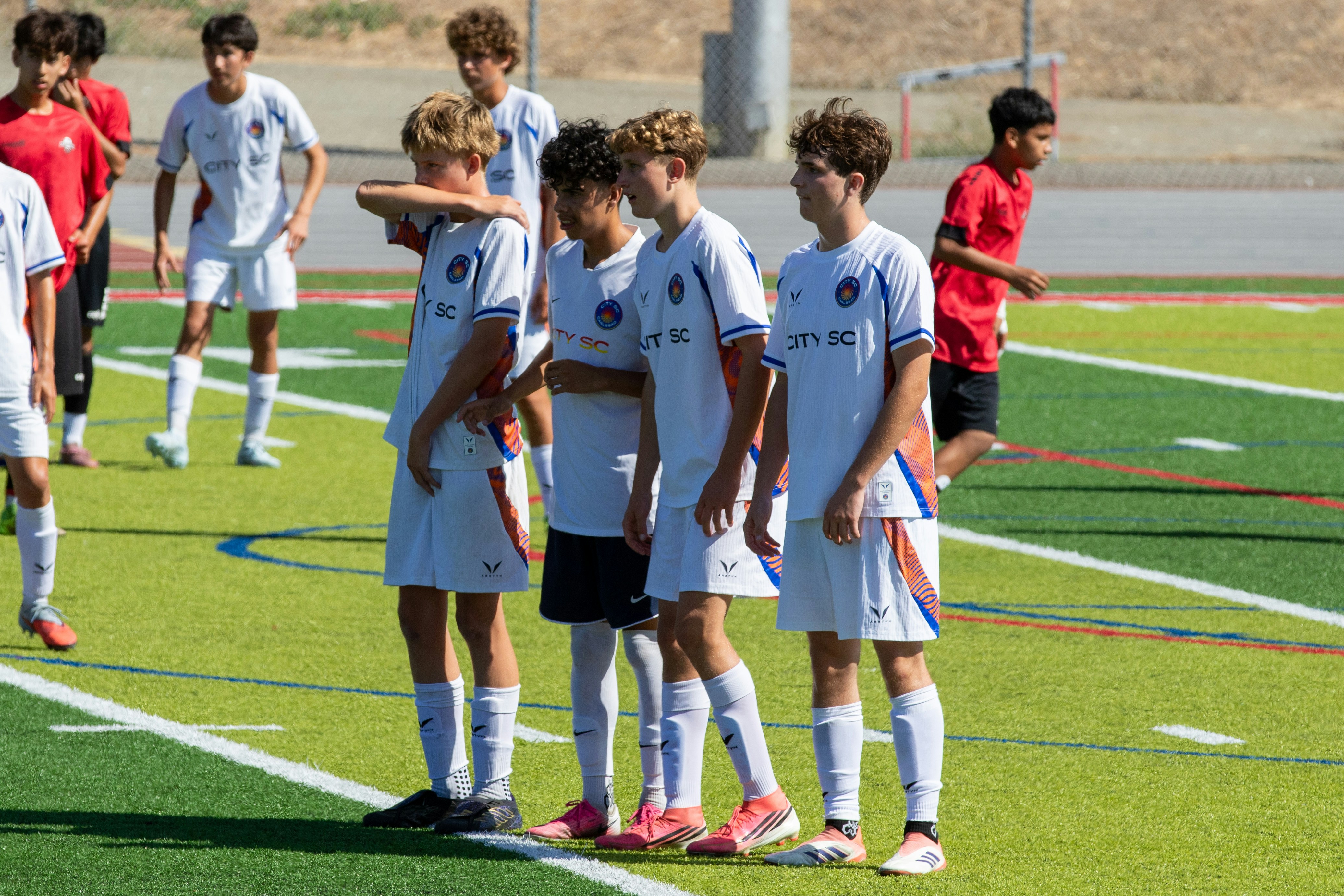 Team Huddle on the Field: Youth Soccer Heads Align