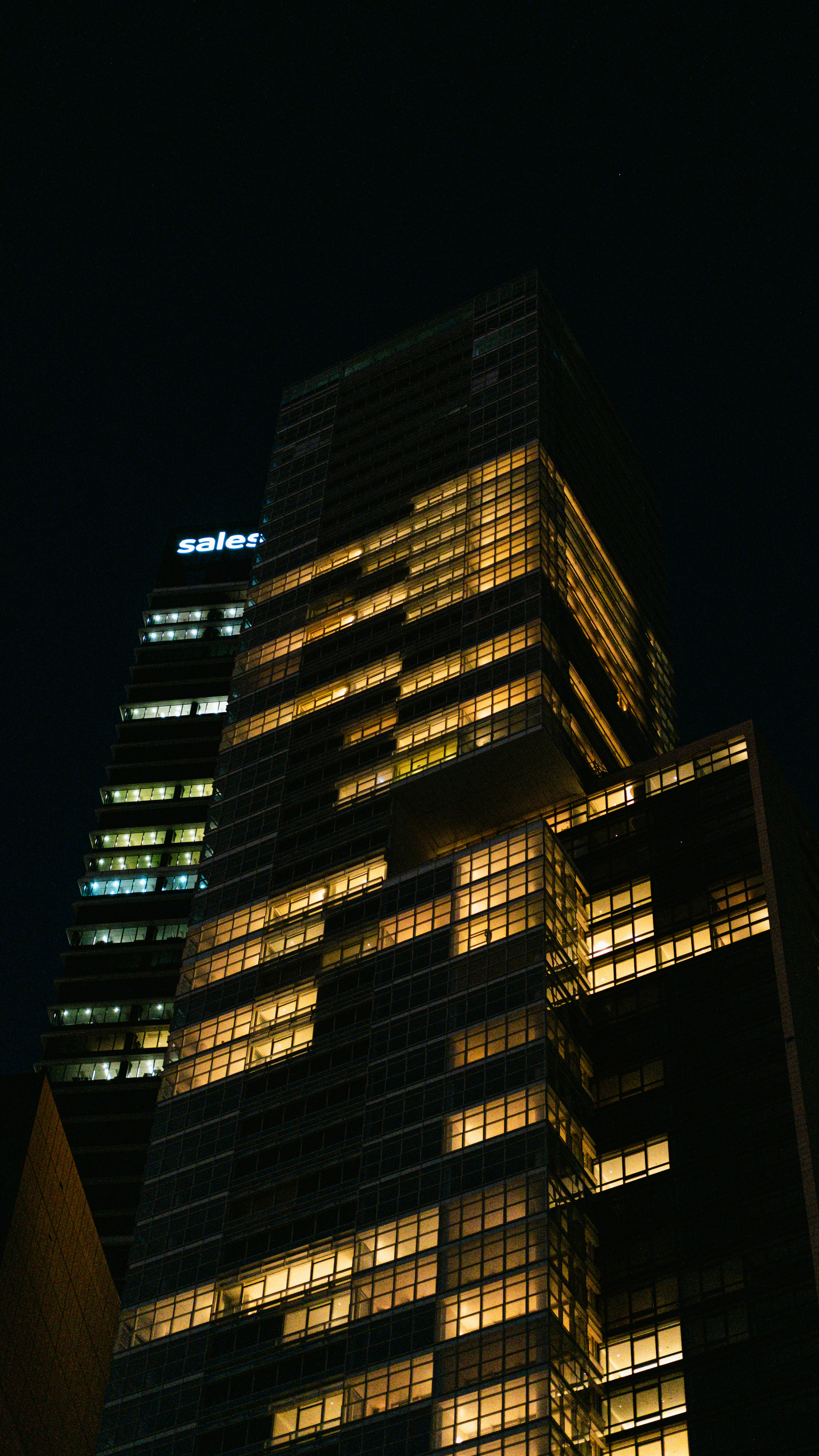 Nightward Skyline: Illuminated Facades Climb Into the Dark