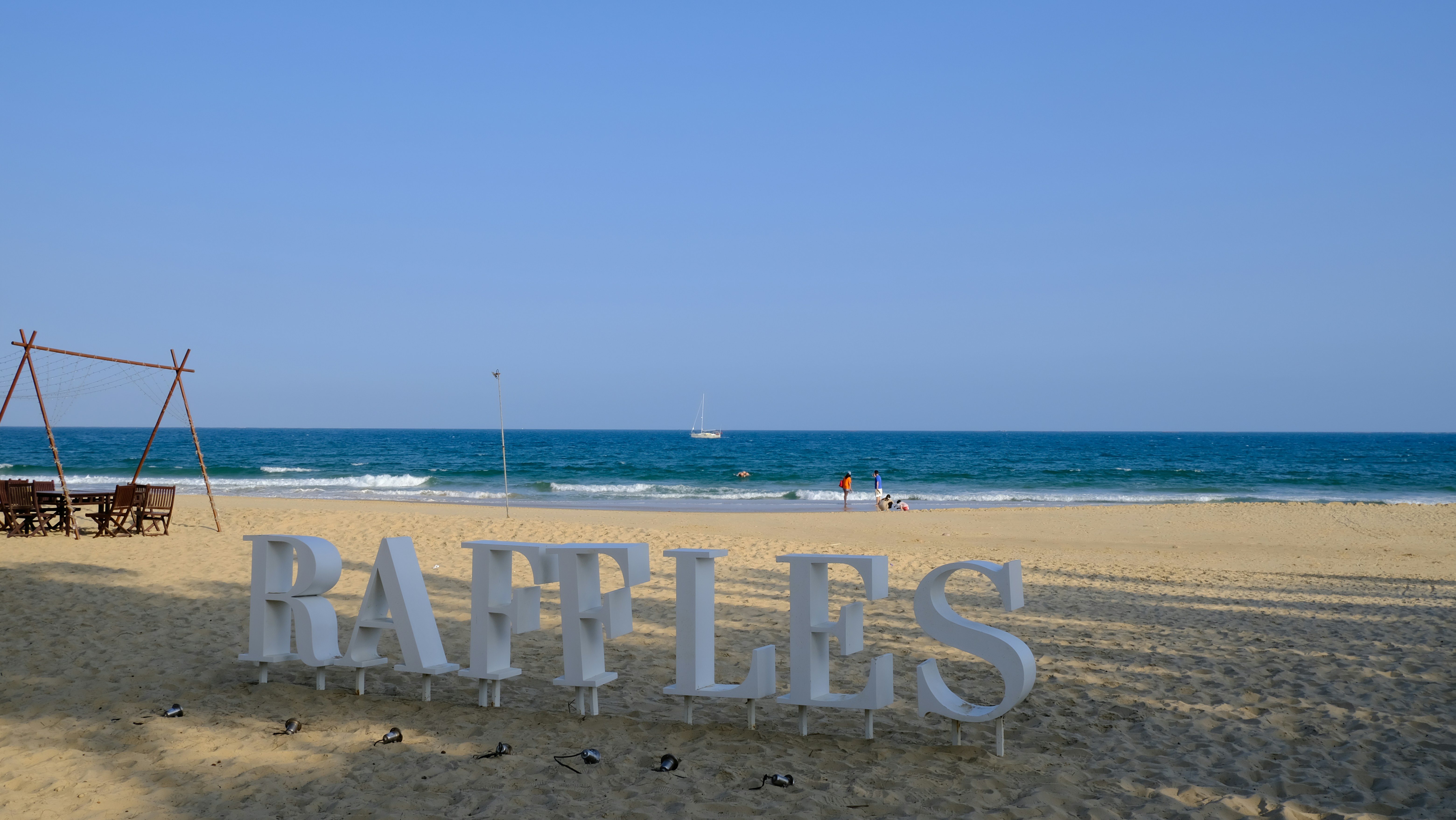 Letters in the Sand: RAFFLES on a Seaside Canvas