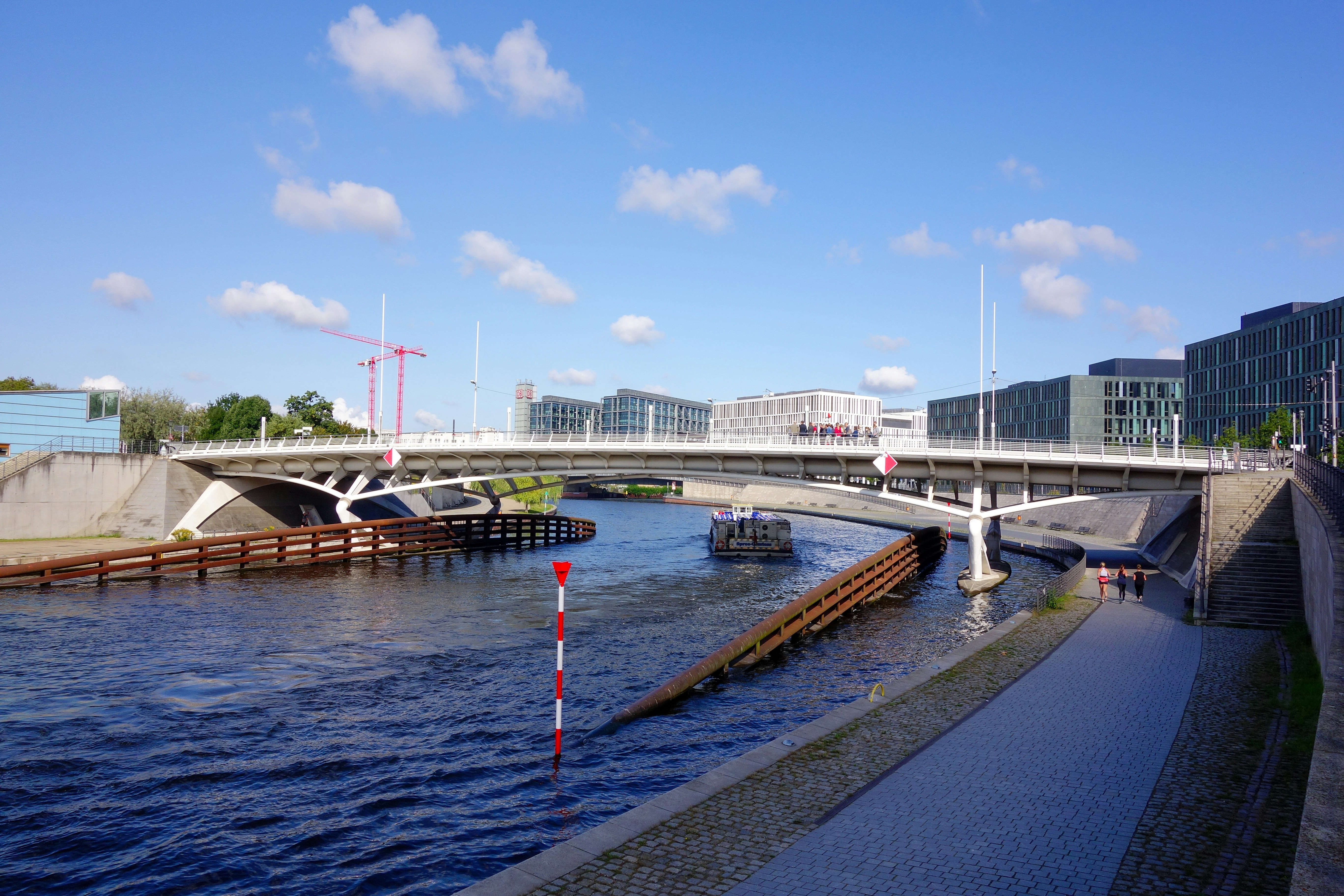 Urban Canal Bridge Under a Bright Summer Sky