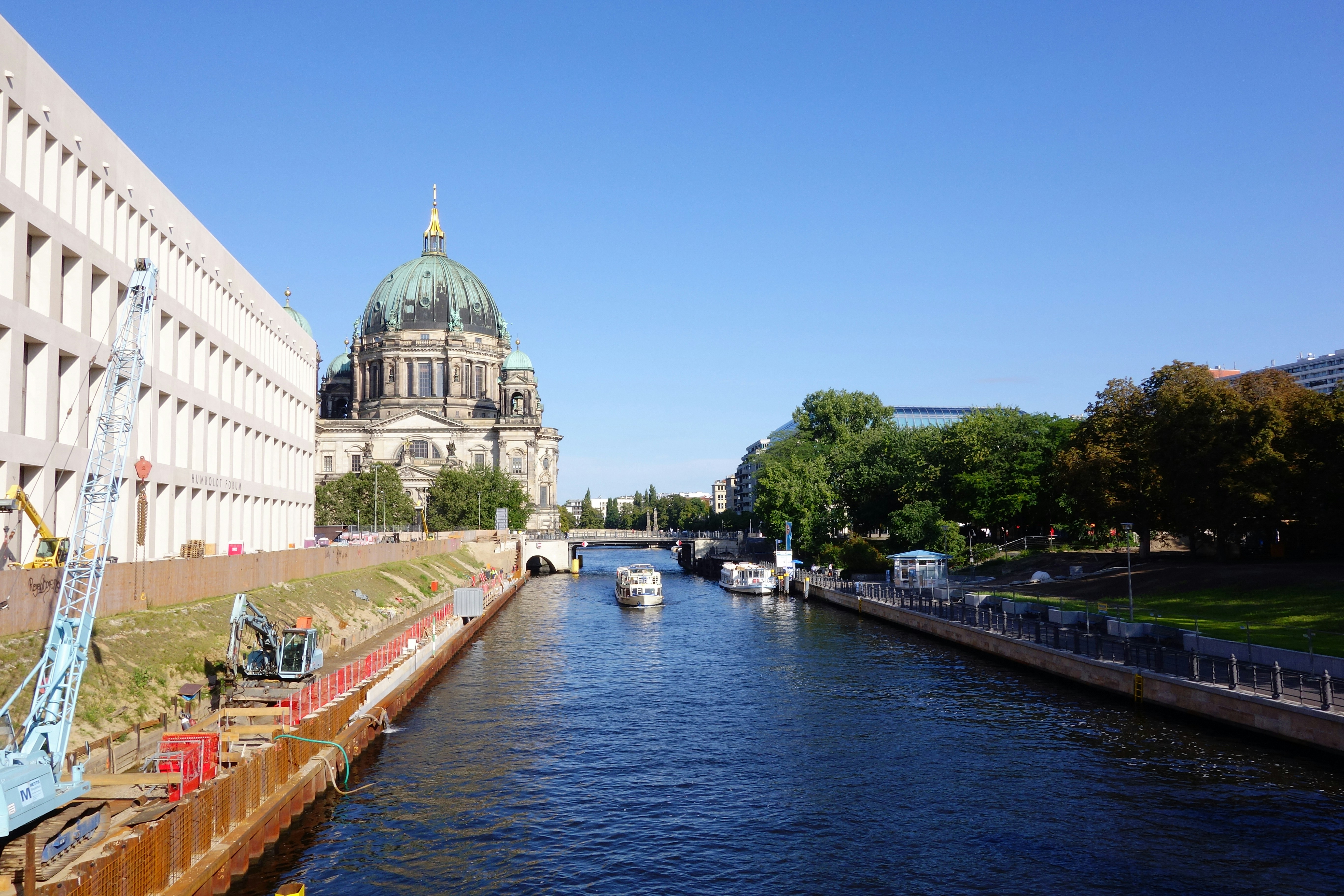 Domed Cathedral and Canal Vista: Berlin-esque Riverfront in Bright Morning Light