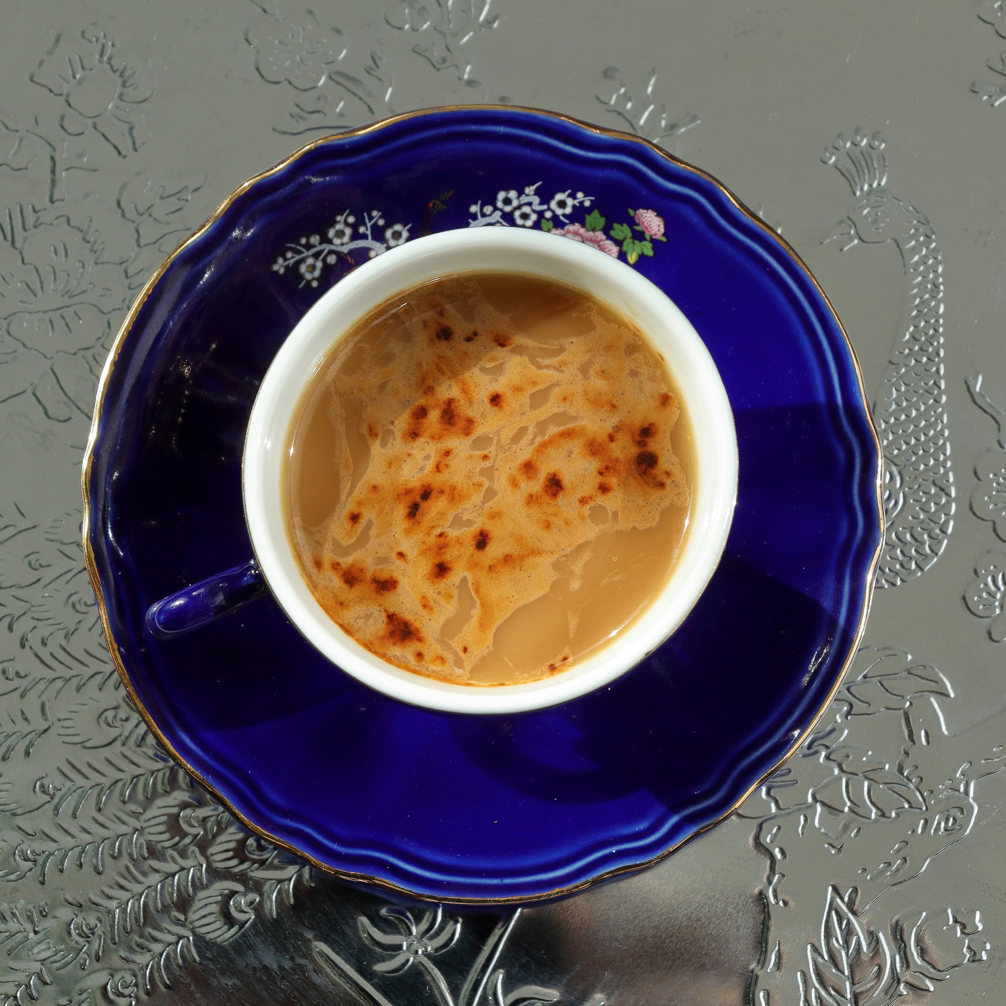 Deep Caramel Swirl in a Royal Blue Cup