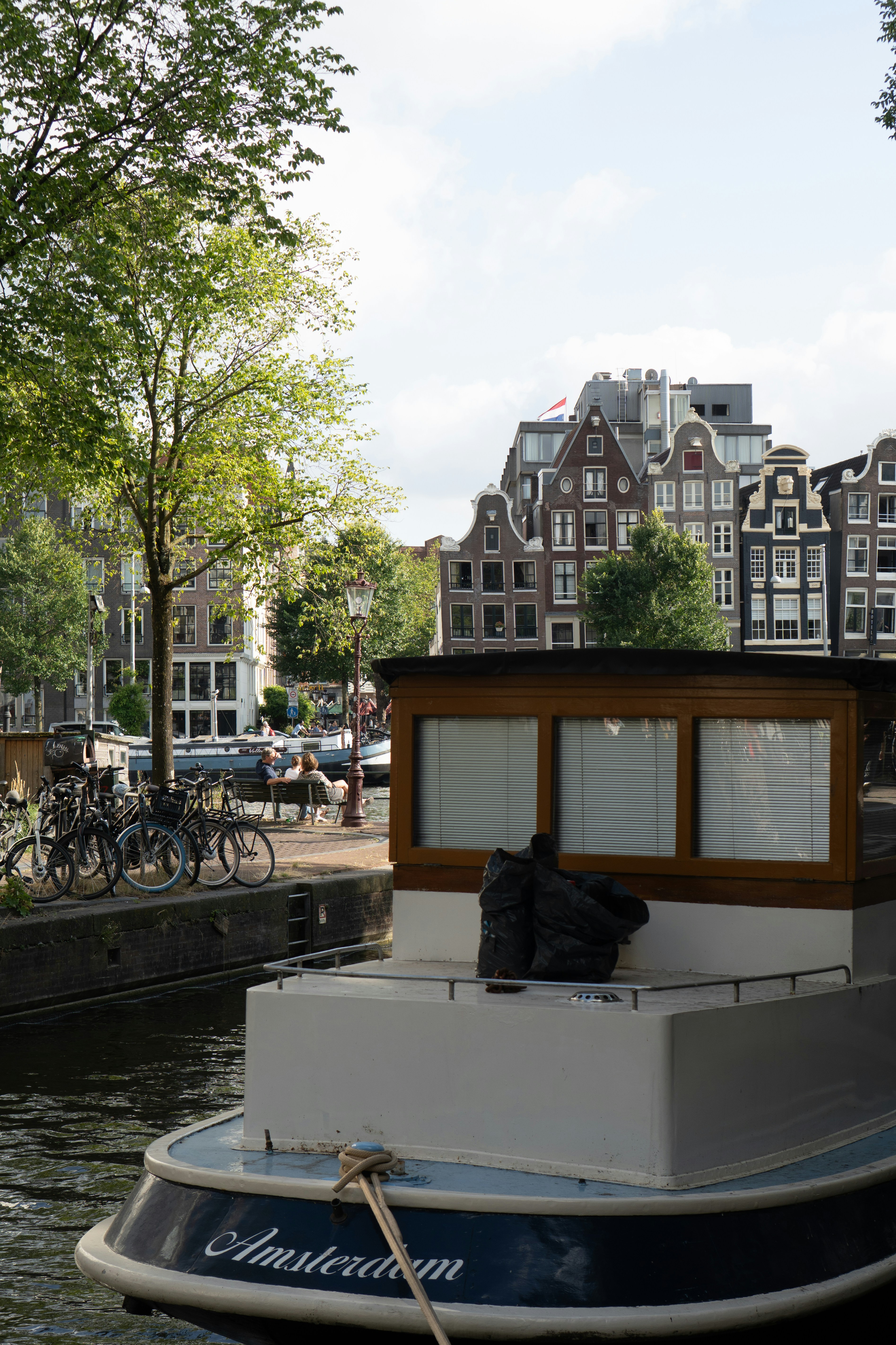 Houseboats by the Amsterdam Canals: A Quiet Morning by the Waterfront