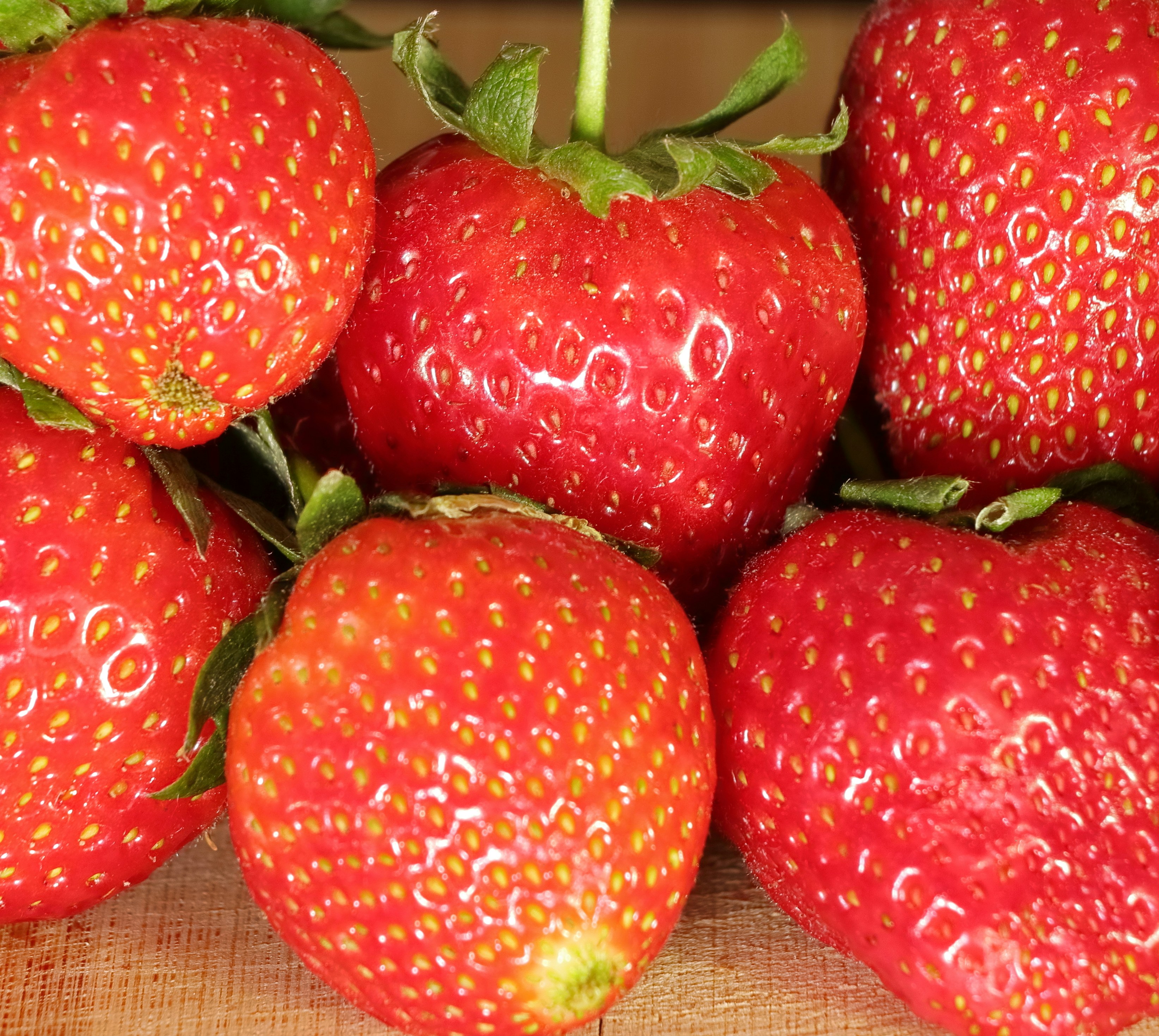 Sweet Crimson Clusters: A Rustic Strawberry Still Life