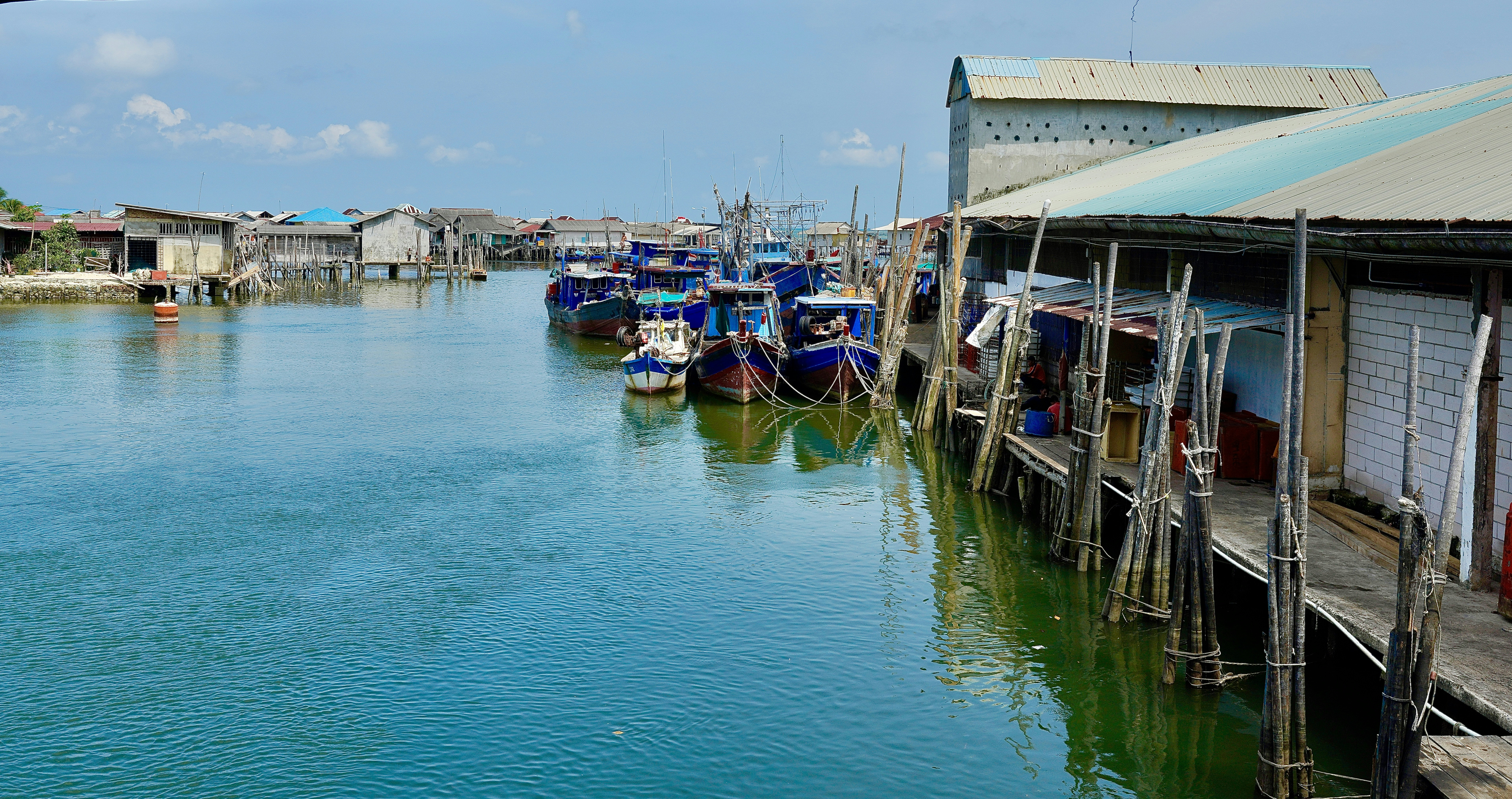 Harbor of Color and Rust: Boats, Boardwalks, and Quiet Water