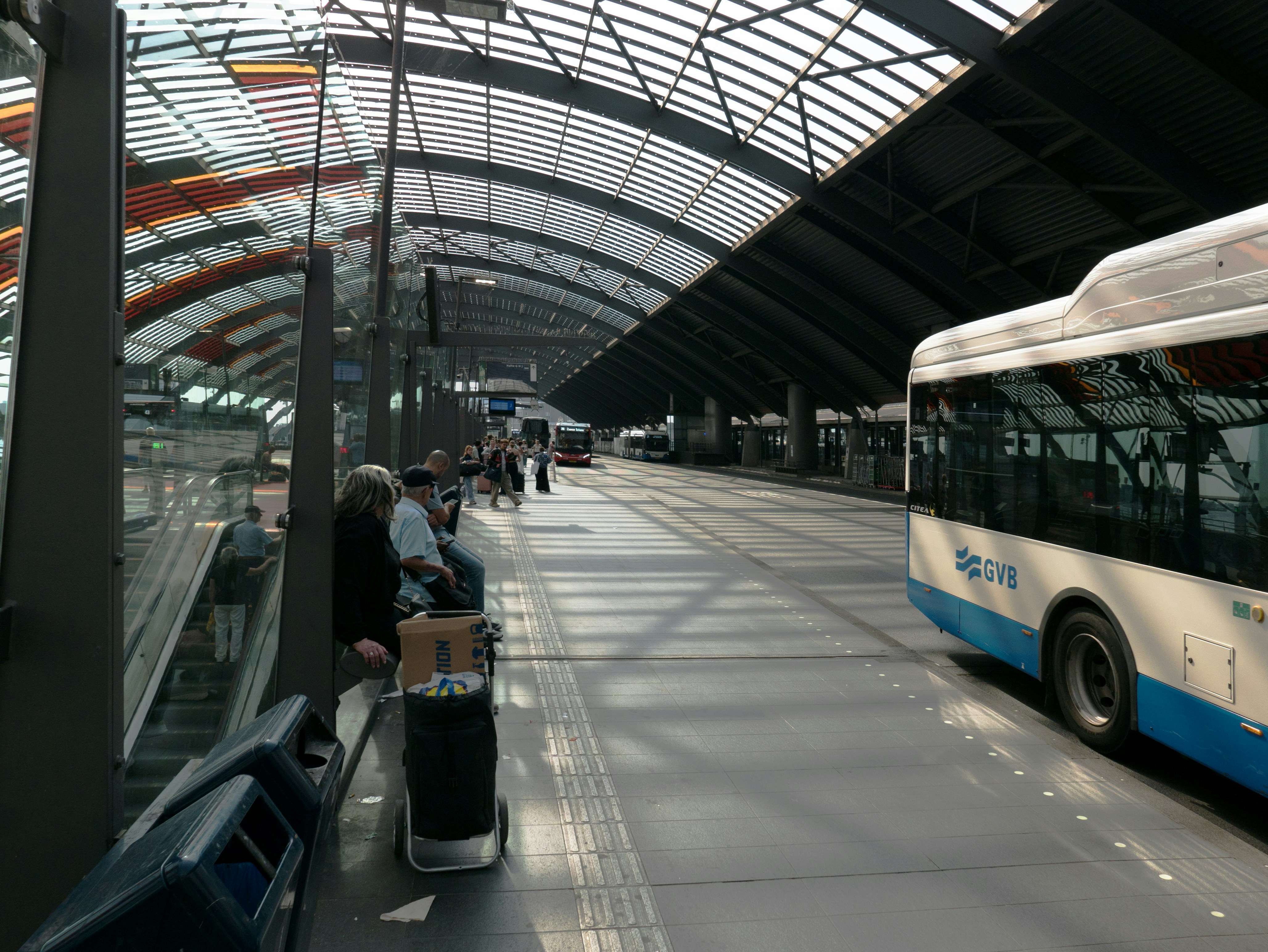 Stationary Transit: A Quiet Moment at the Glass-Chelsea Platform