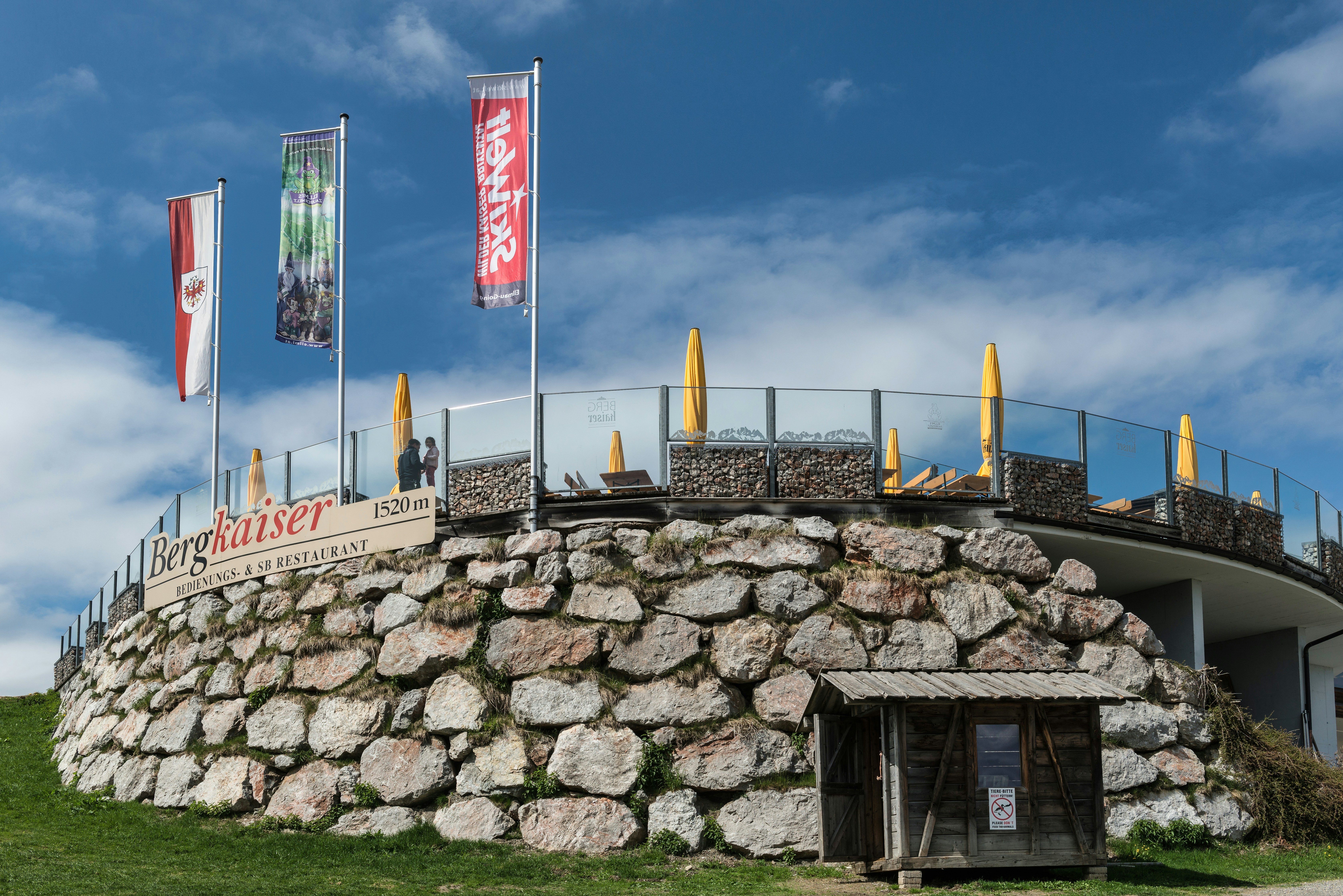 Flagged Terrace: A Sunlit Stone Rim Overlooking the Coast
