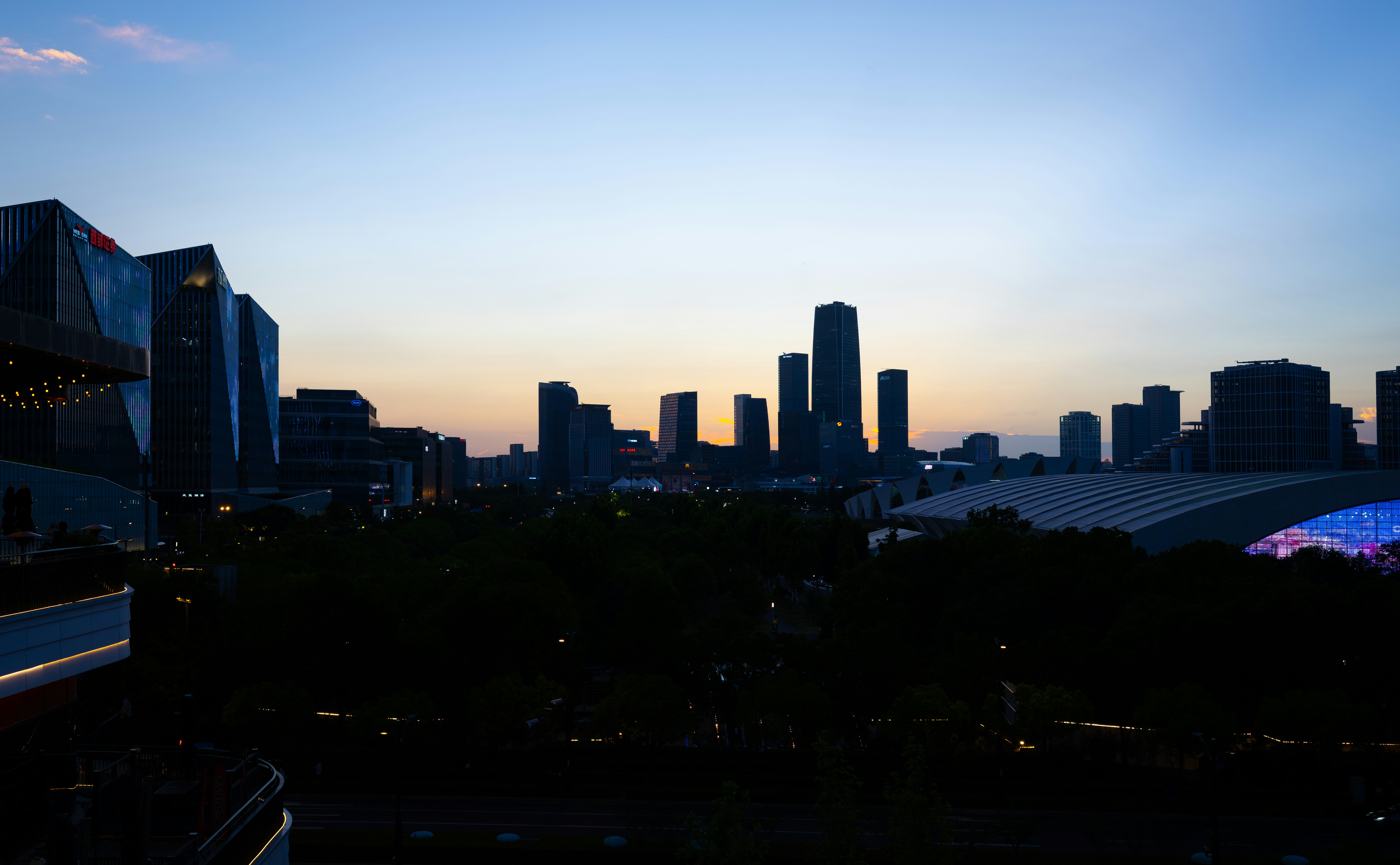 Dawn Over the Glass Canyon: City Silhouette at Quiet Light