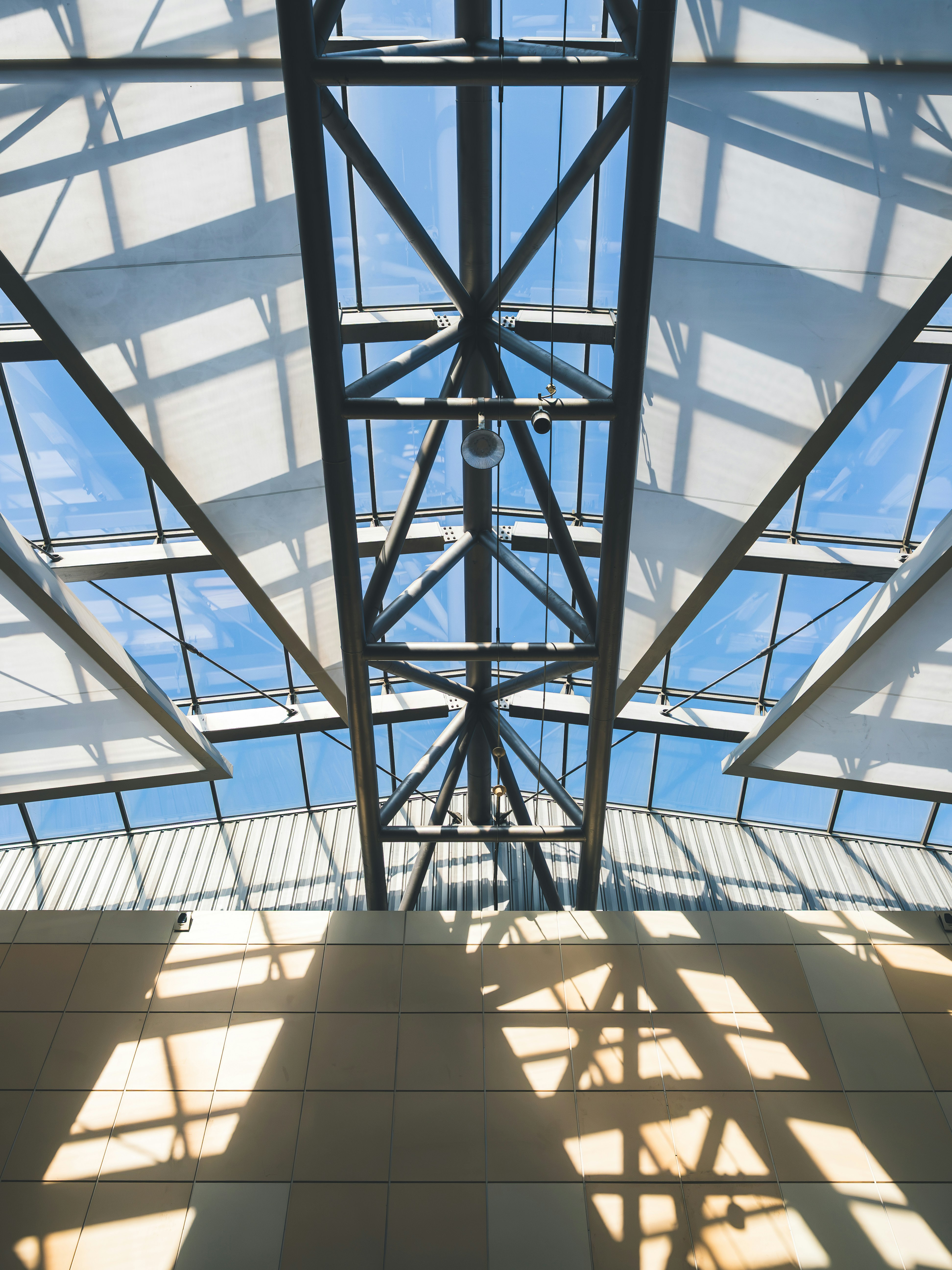 Skyward Truss: A Geometric Cathedral of Glass and Steel