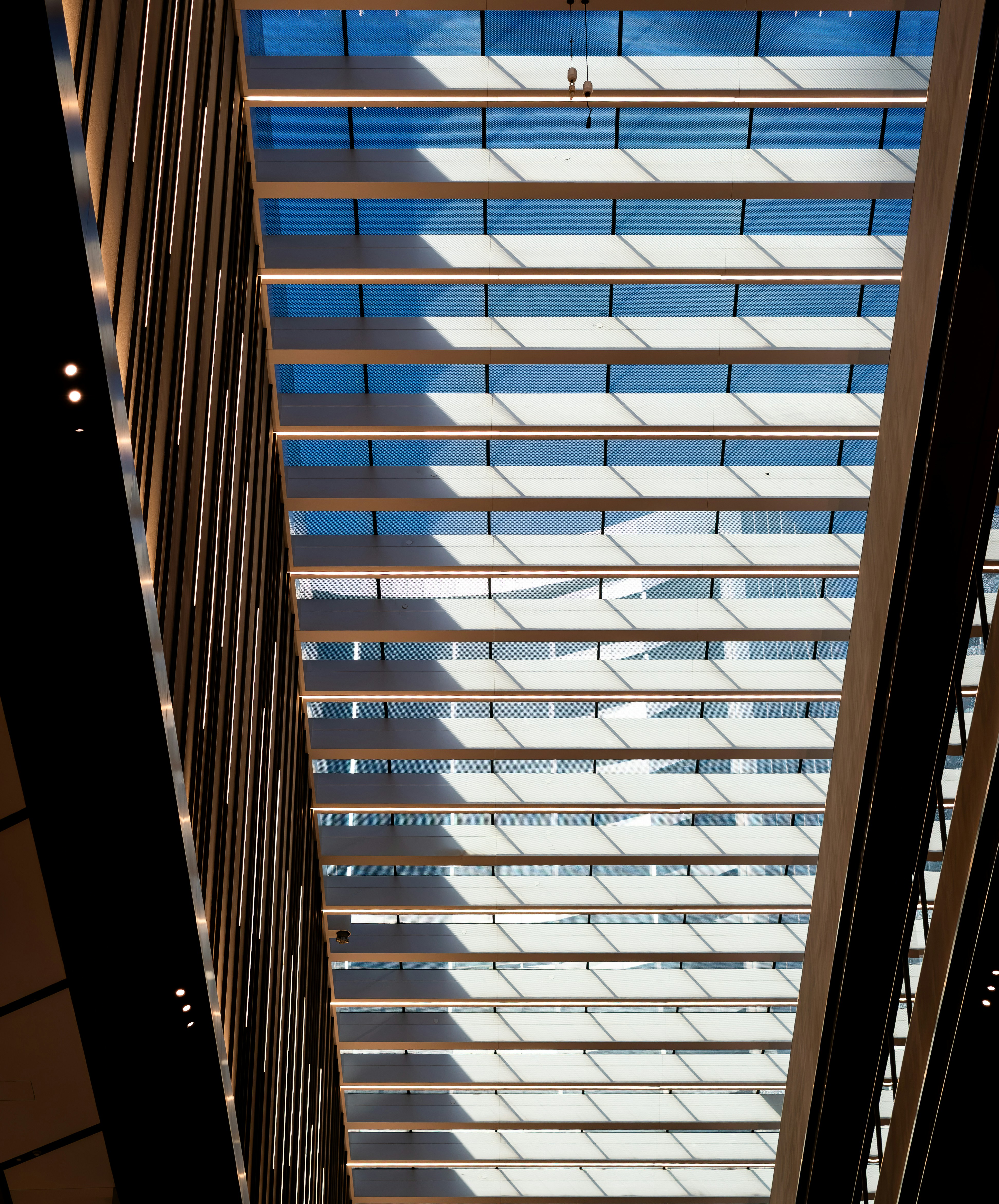 Skyward Echoes: Repeating Beams in a Modern Atrium