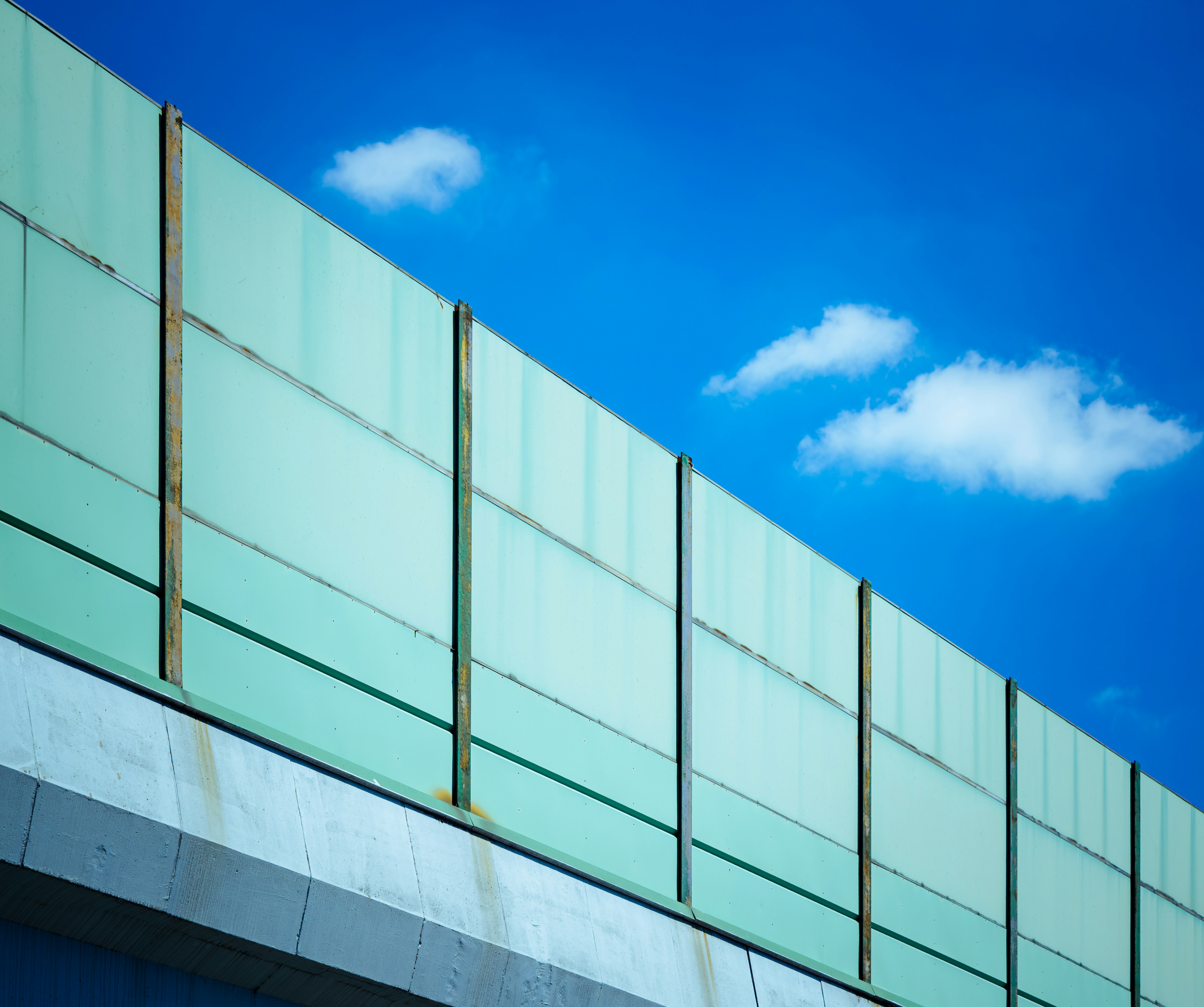 Azure Glass and Steel: A Bold Exterior Line