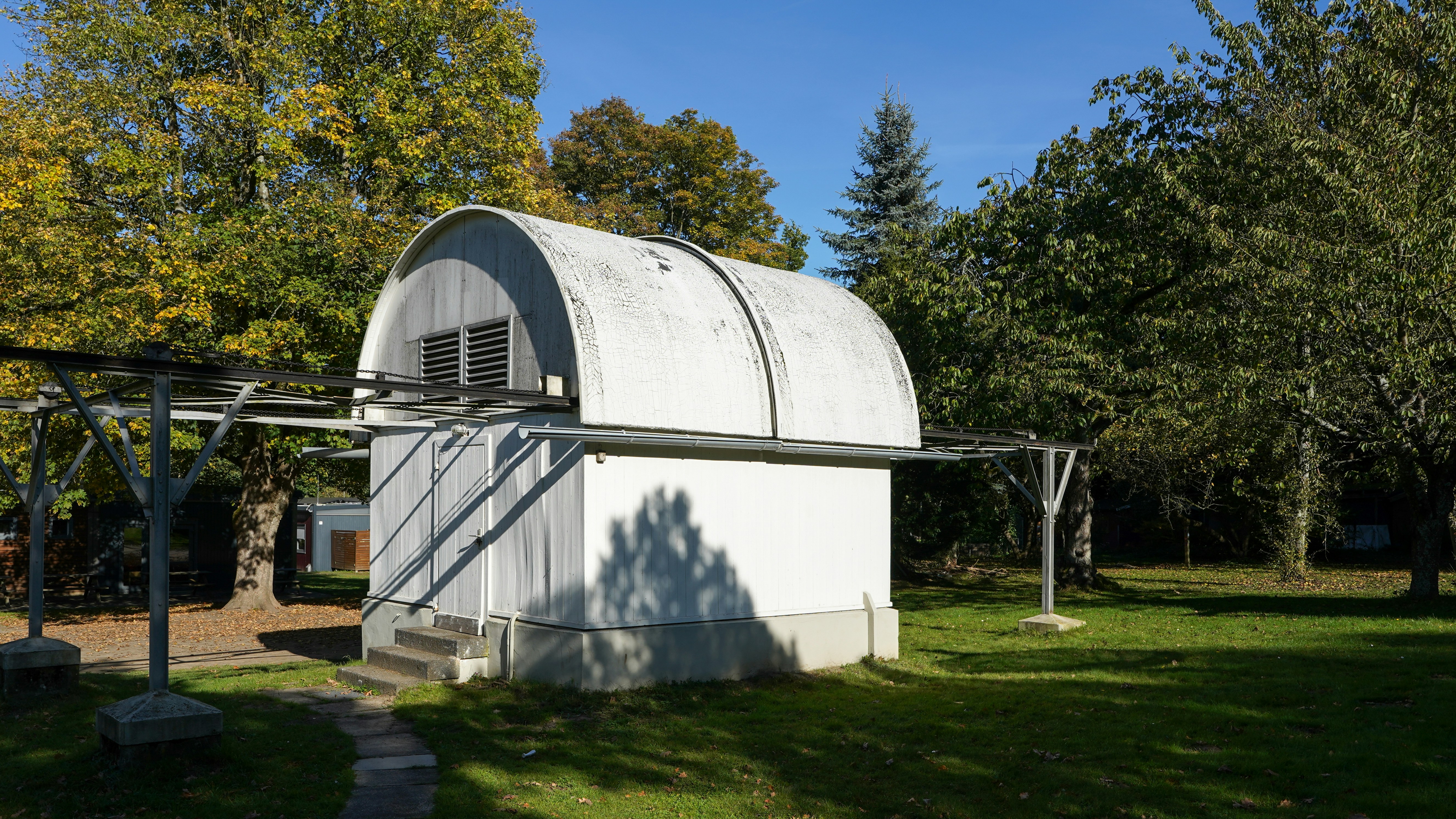 Curved Shelter in Sunlit Park