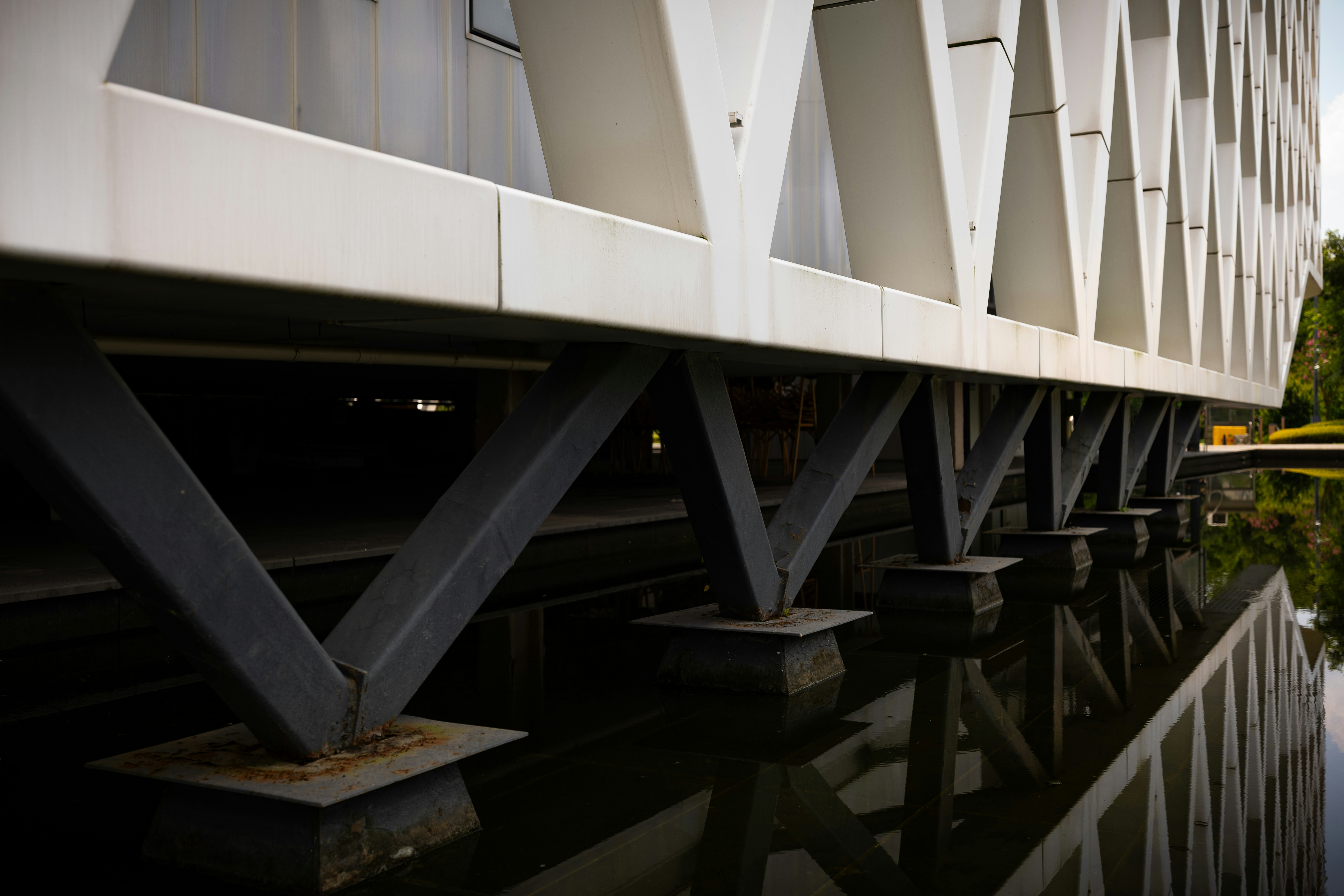 Industrial Support Lines: Reflections Under the Bridge