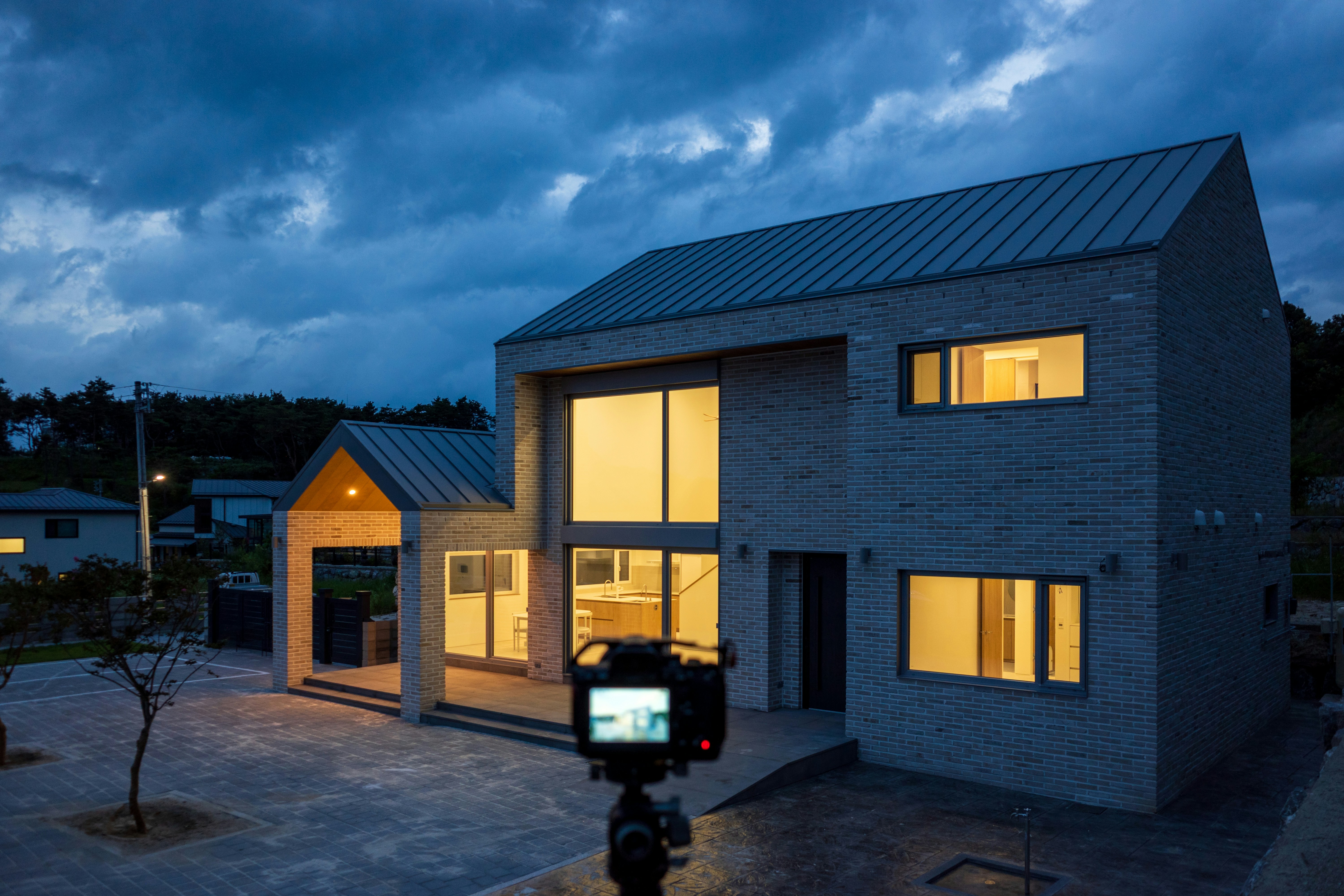 Warm Interior Glow Framed by a Quiet Twilight Exterior