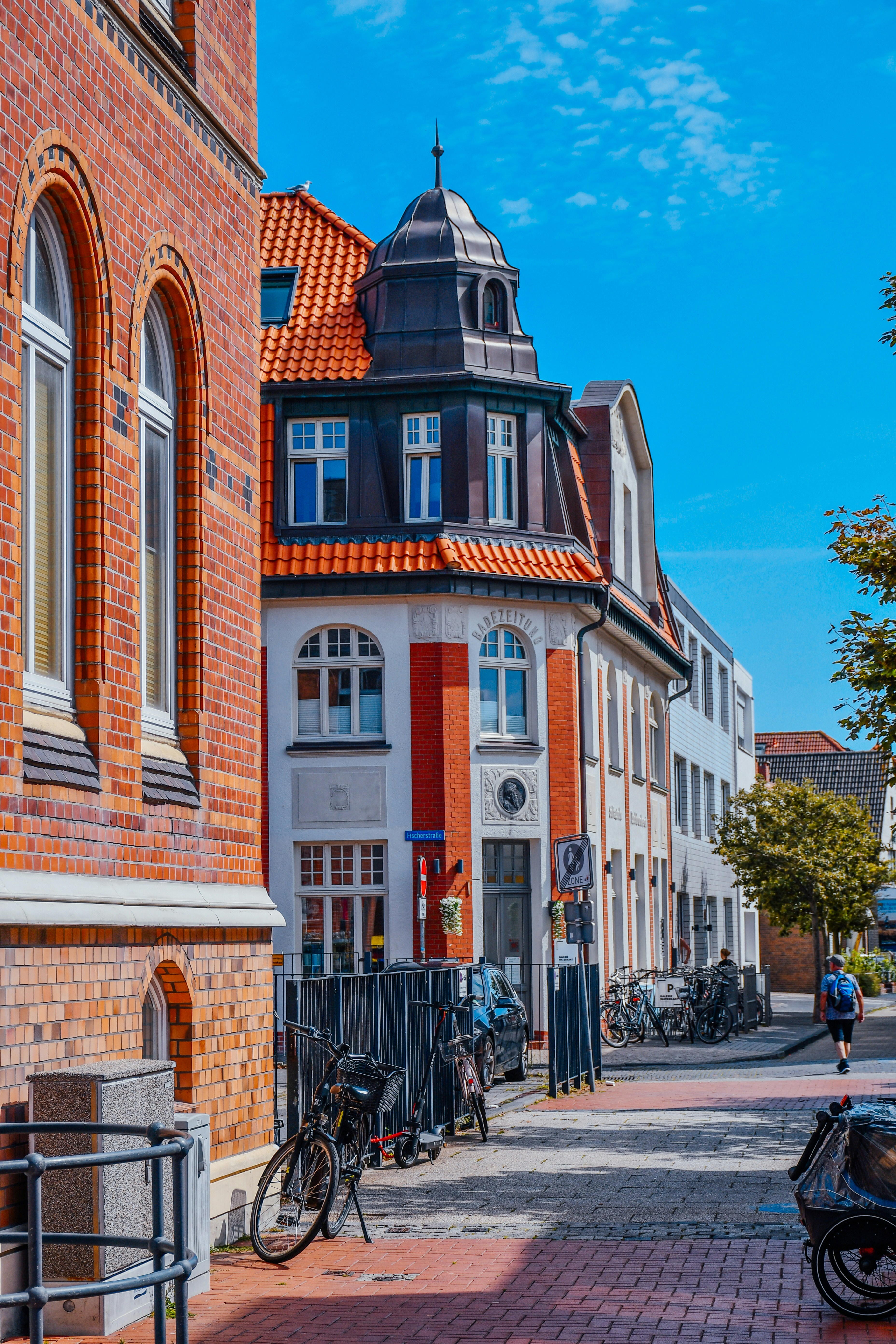 Red-brick Cornered Charm on a Sunny European Street