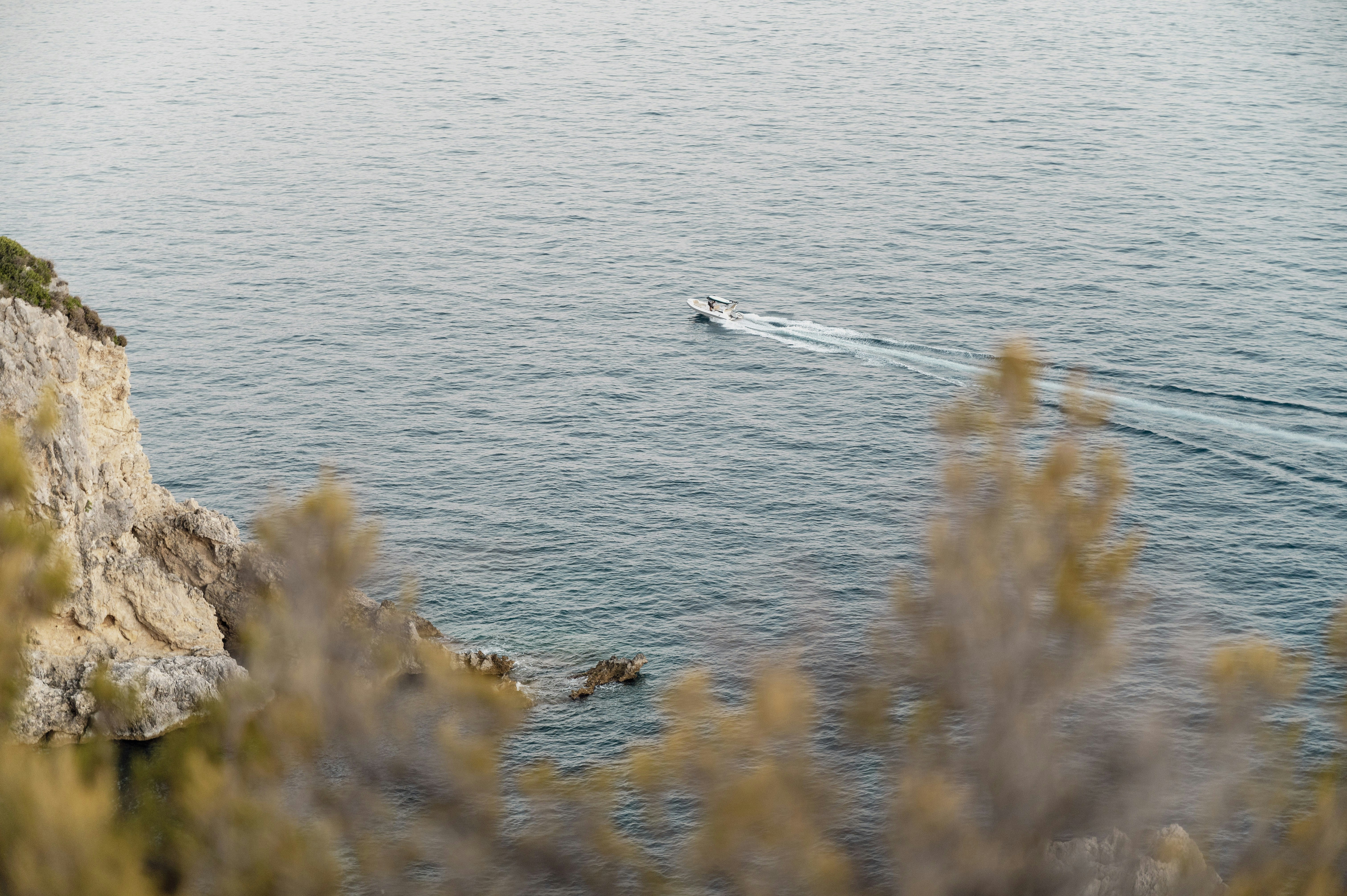 Boat Wake Traces along a Quiet Coastal Edge