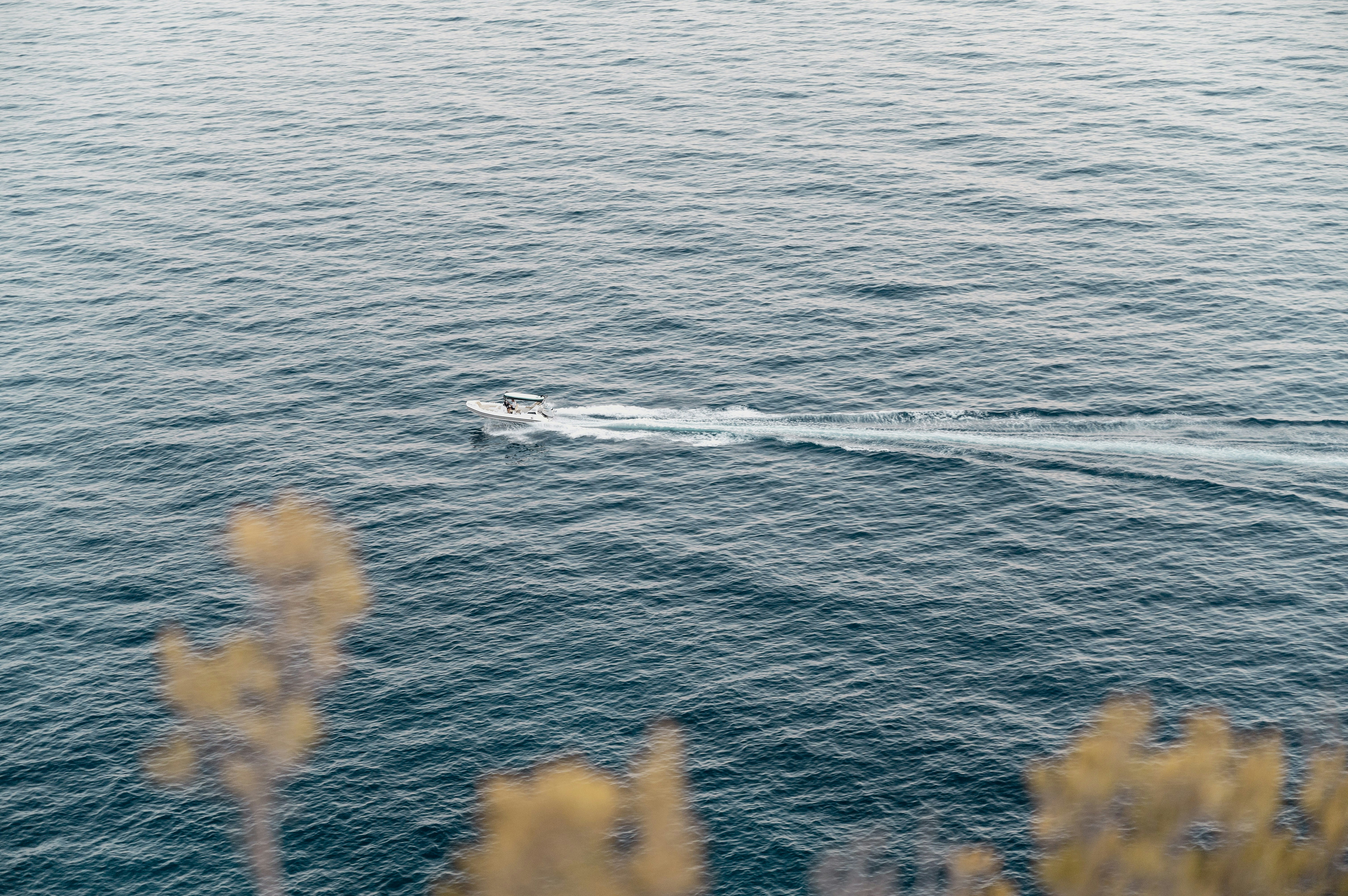 Speeding Wake Across Blue Quiet