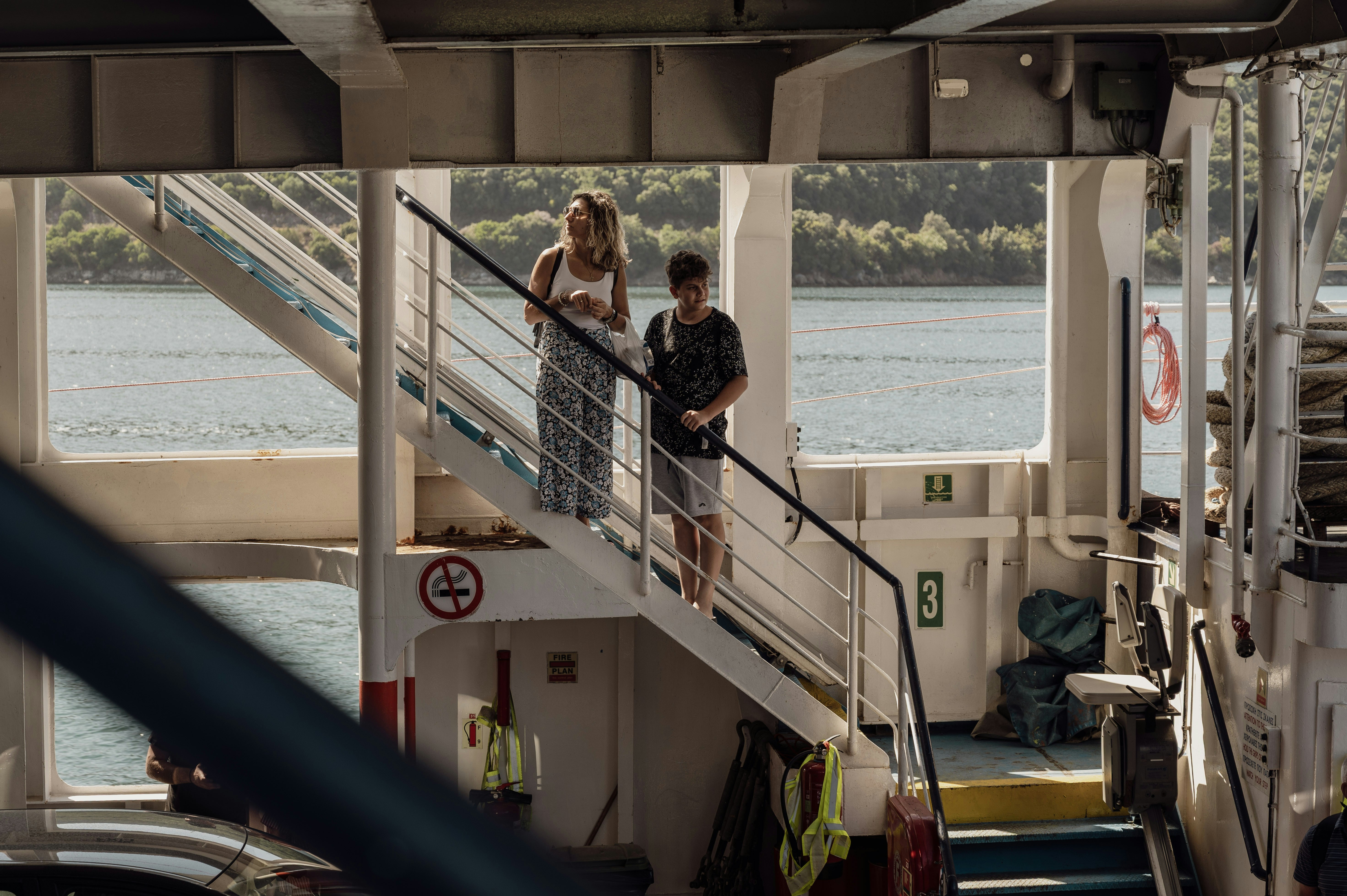Passengers at a Stairs Landing by the Water