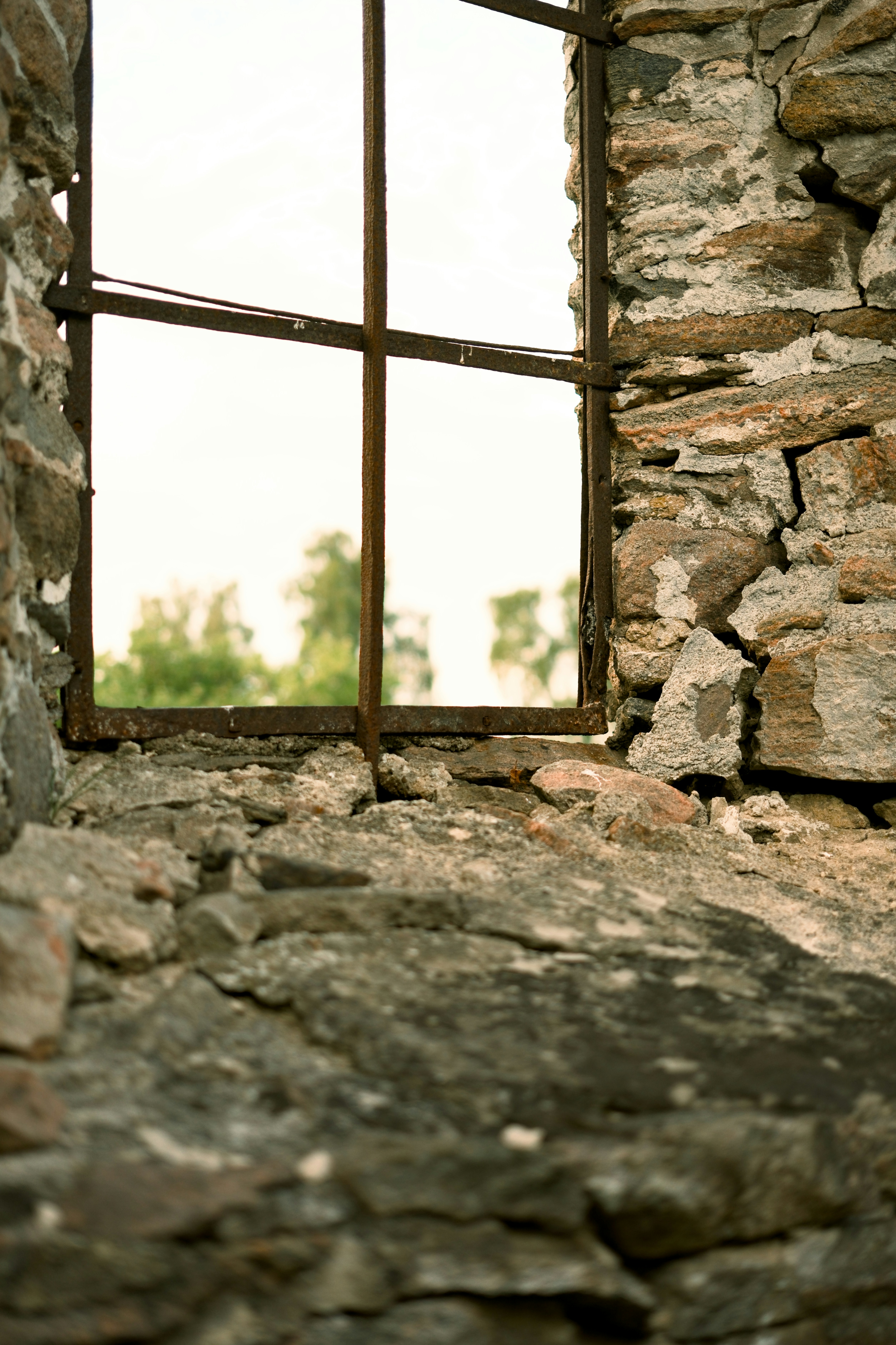 A Weathered Window Framing a Quiet Horizon