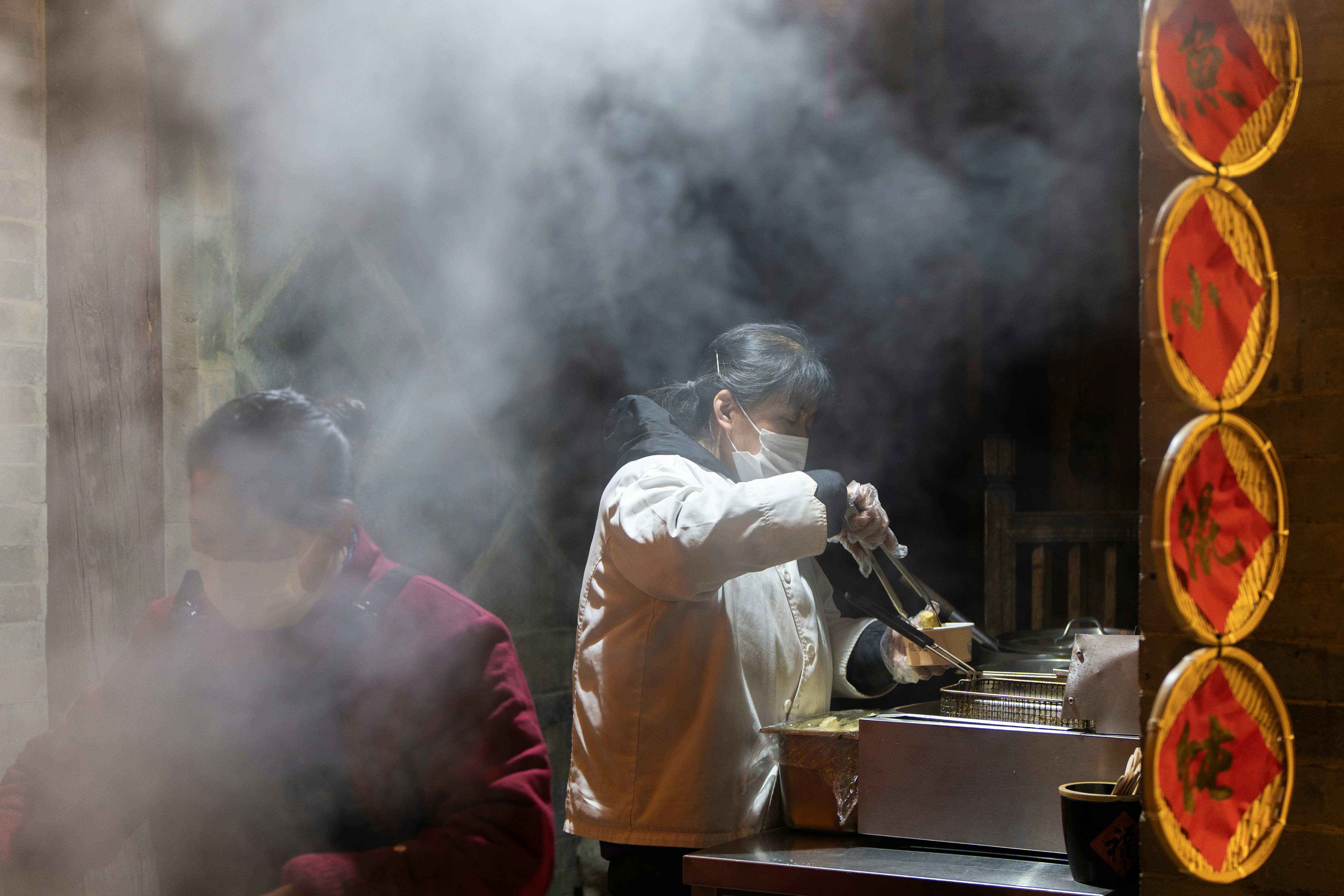 Steam and Sizzle: A Quiet Moment at a Street Kitchen