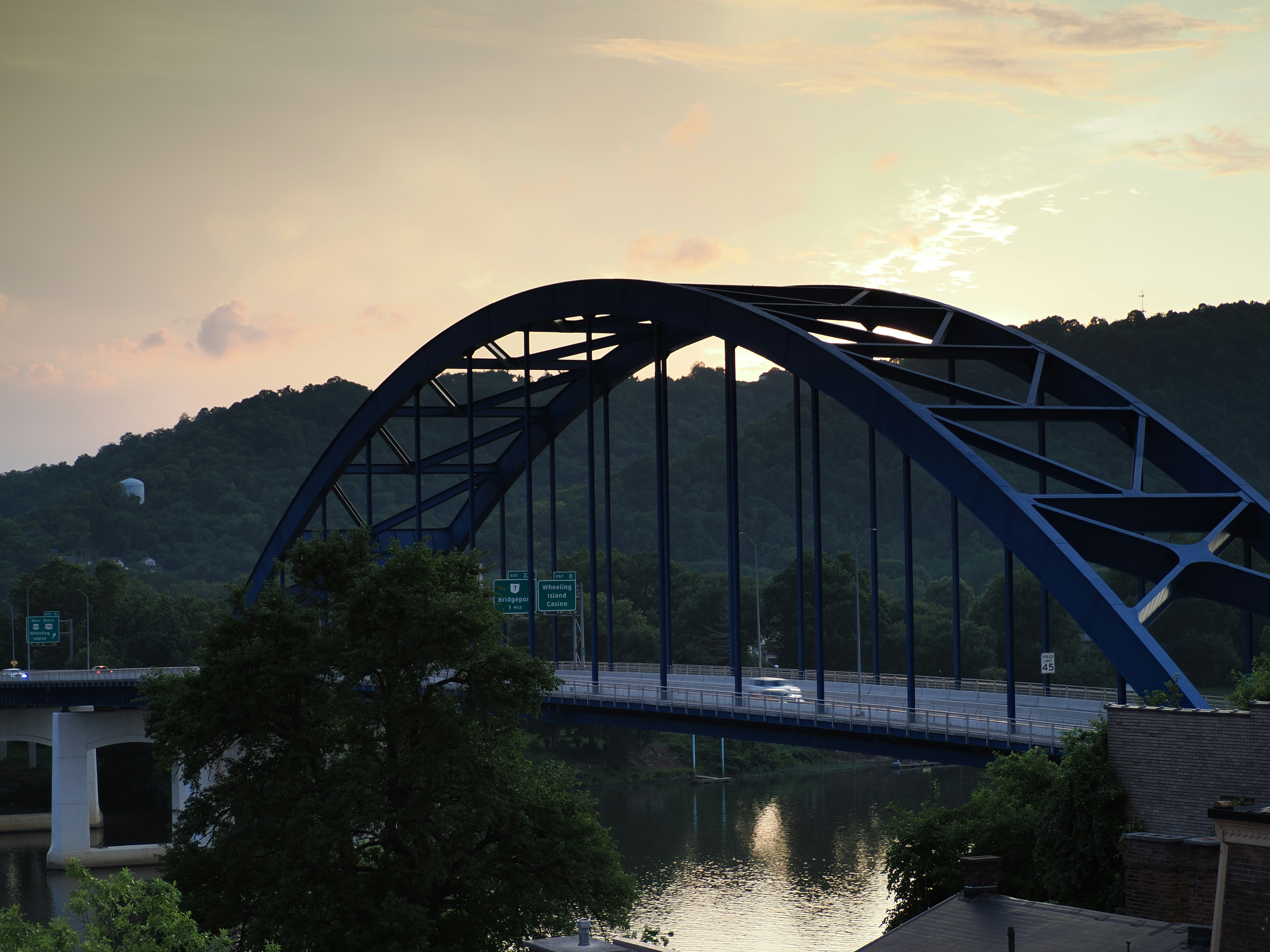 Blue Arch Over Quiet Waters: A Late-Sunset Bridge Study